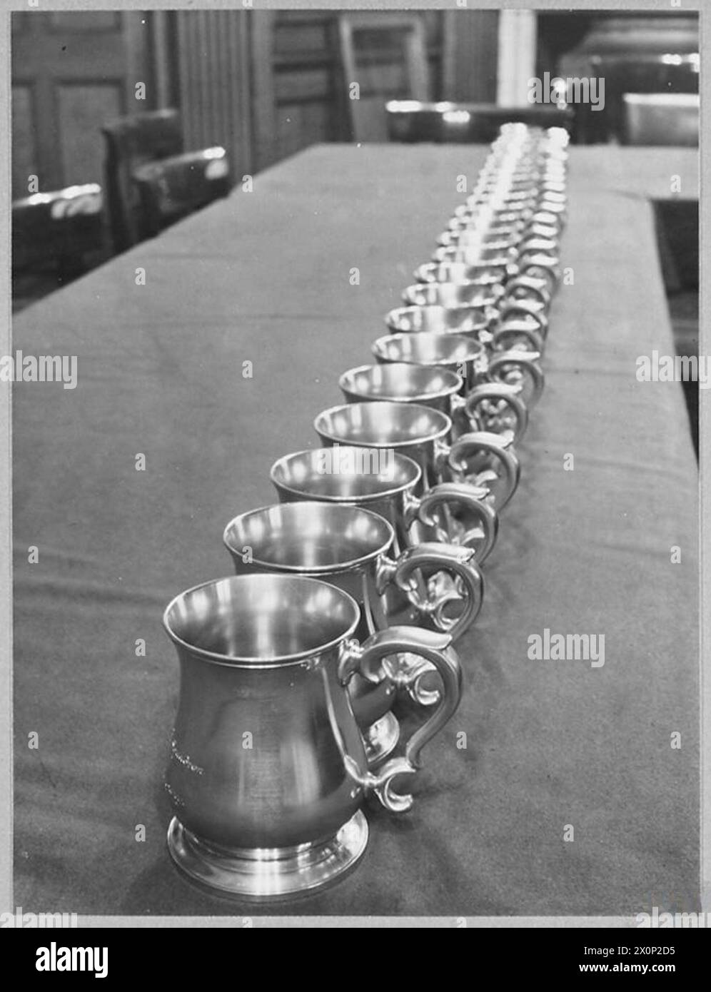 Photograph showing the presentation of pewter tankards by the Merchant ...