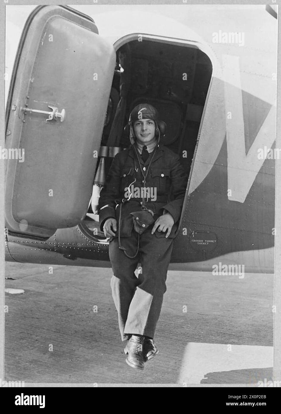 LEADING AIRCRAFTMAN KENNETH STIRLING FREEMAN - Leading Aircraftman Freeman seated in the doorway ...