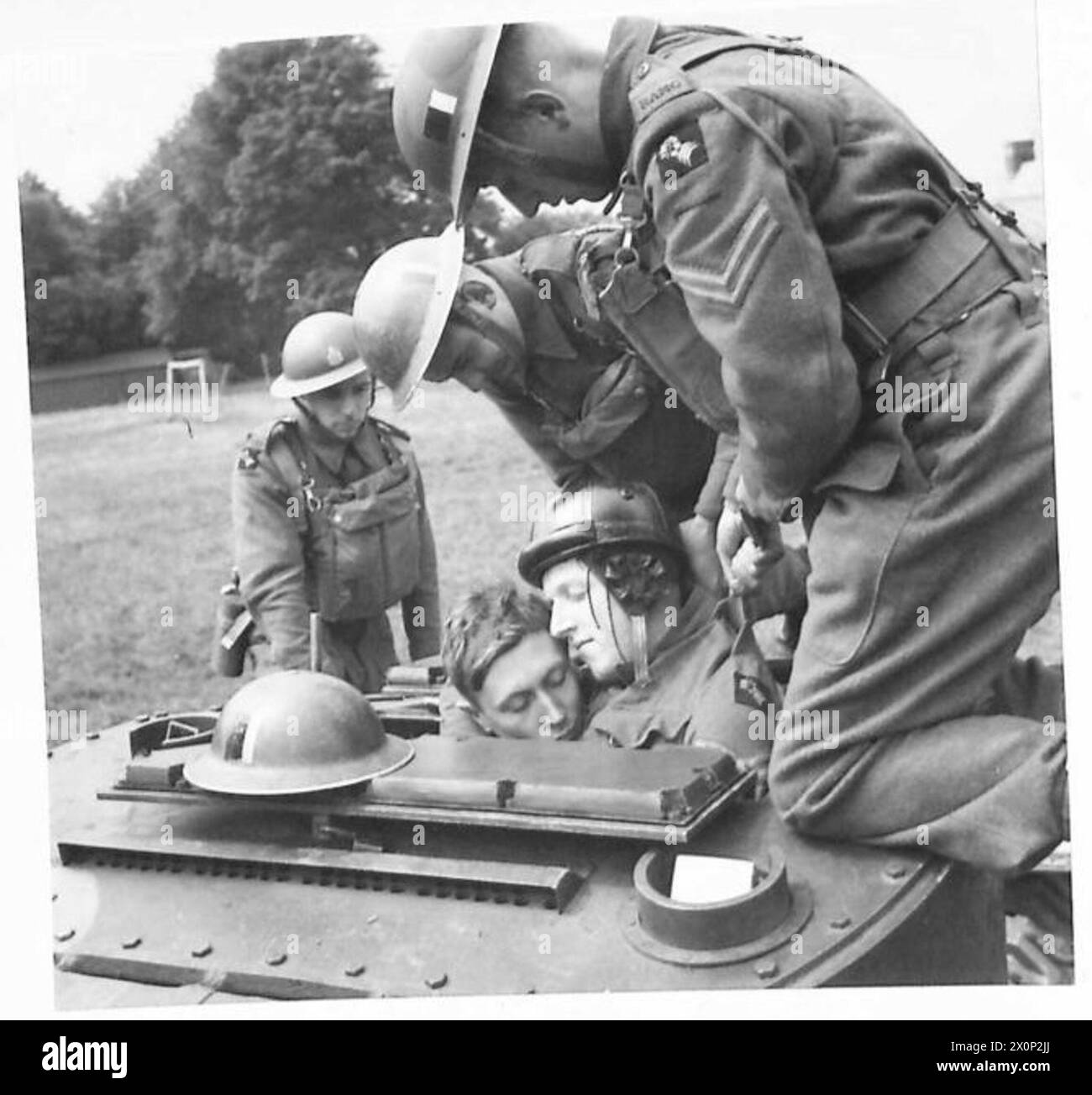 A method is demonstrated to lift a casualty from a tank during British ...