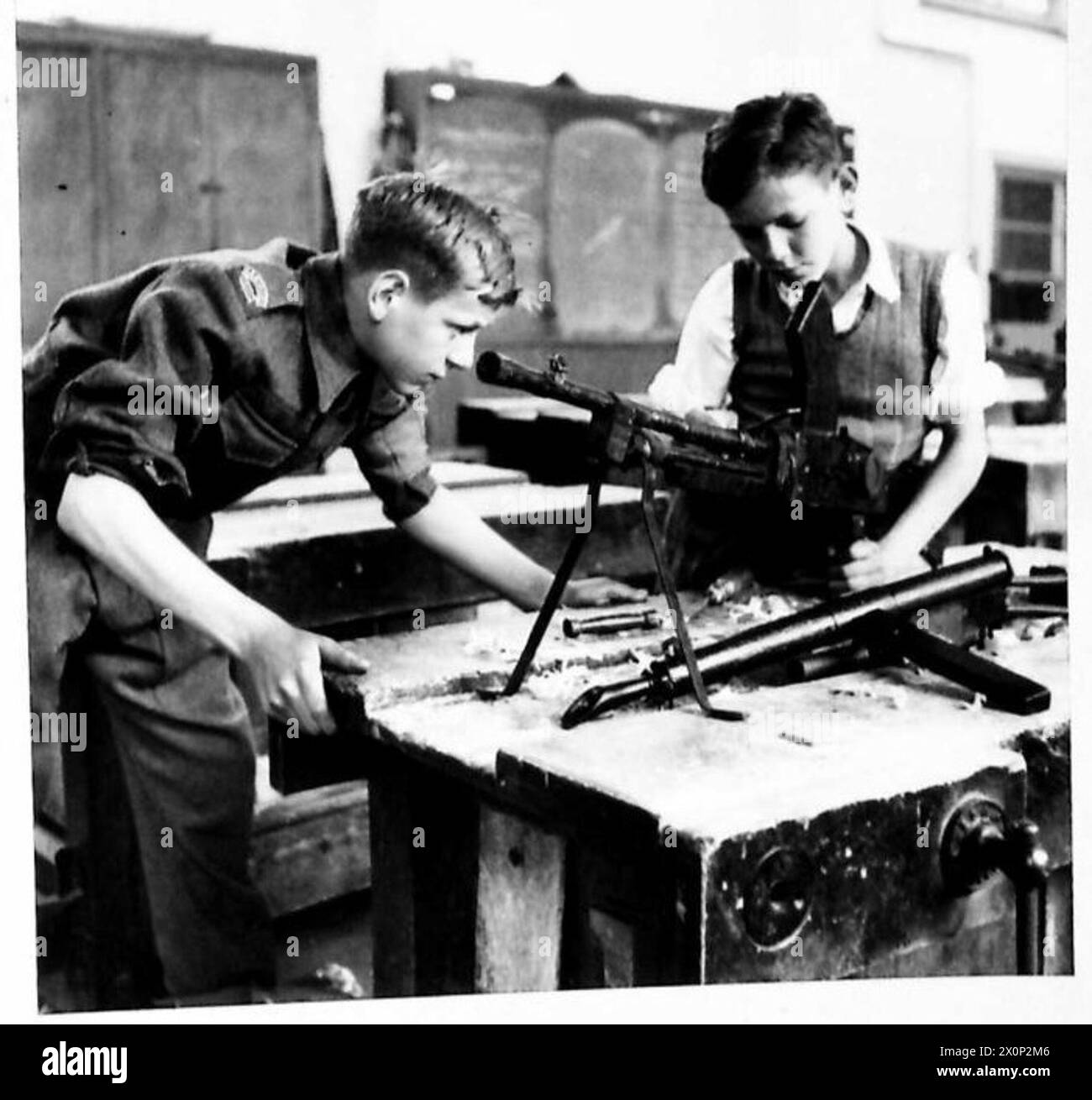 ARMY CADET FORCE - Cadets working on weapons in the club's workroom ...