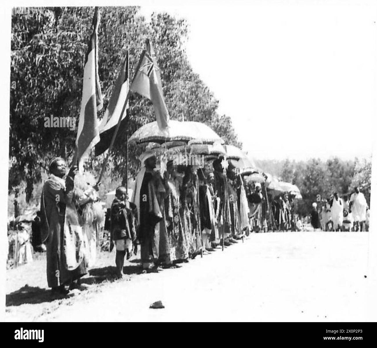 Members of the Abyssinian Church display flags during a ceremony in ...