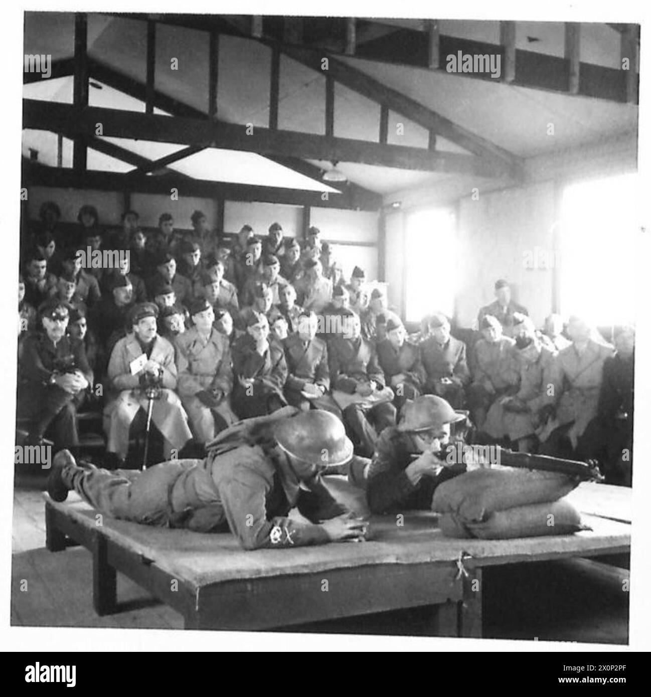 AMERICAN FORCES VISIT WEAPON TRAINING SCHOOL - The scene in a lecture ...