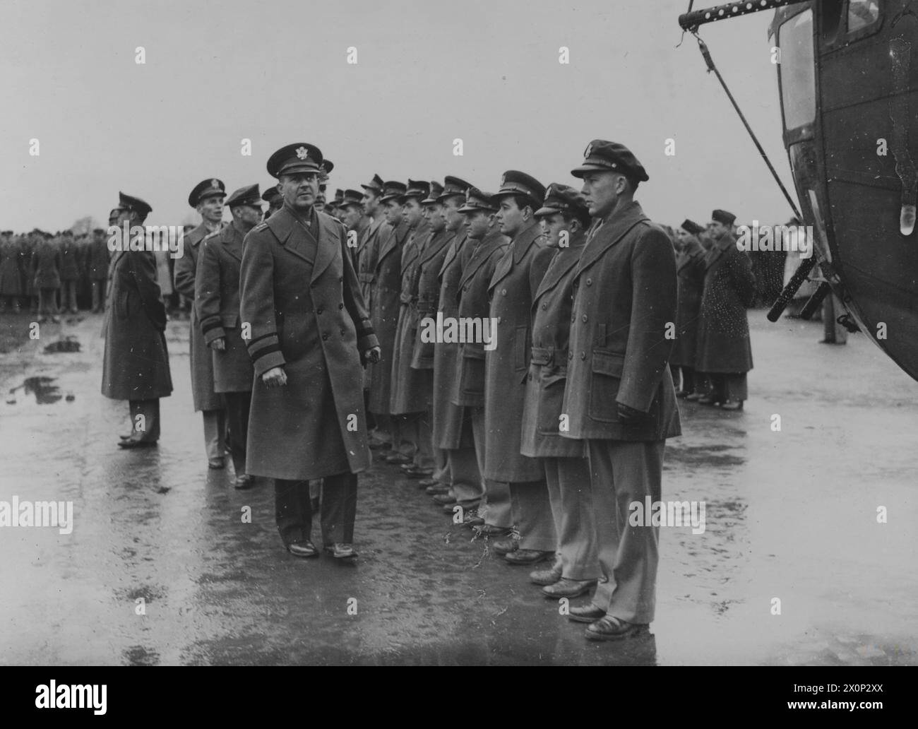 General Jacob Devers inspects the aircrew of the 44th Bomb Group and ...