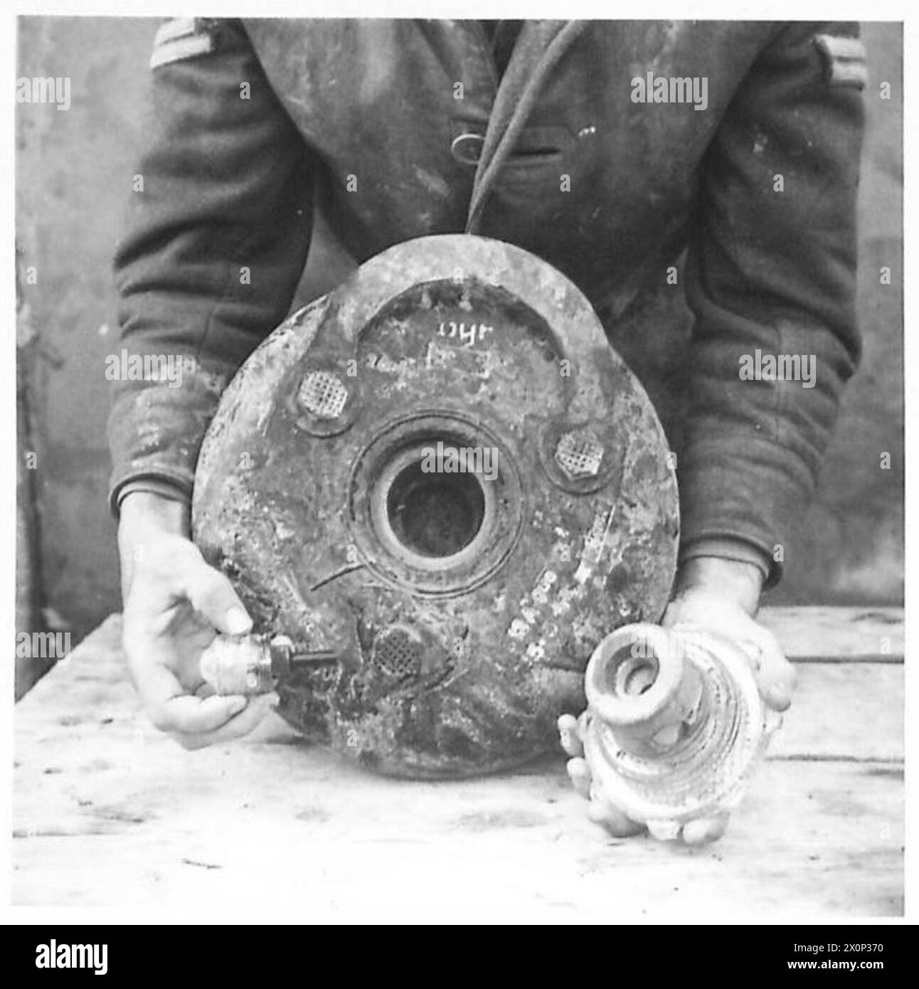 Photograph of a detonator and glass cap containing the primer from a ...