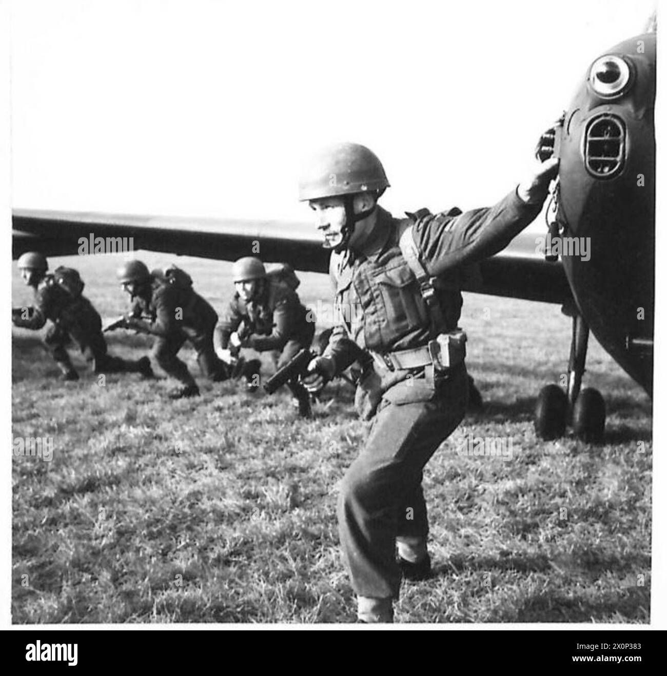 Glider crews exit their aircraft and advance to engage simulated enemy ...