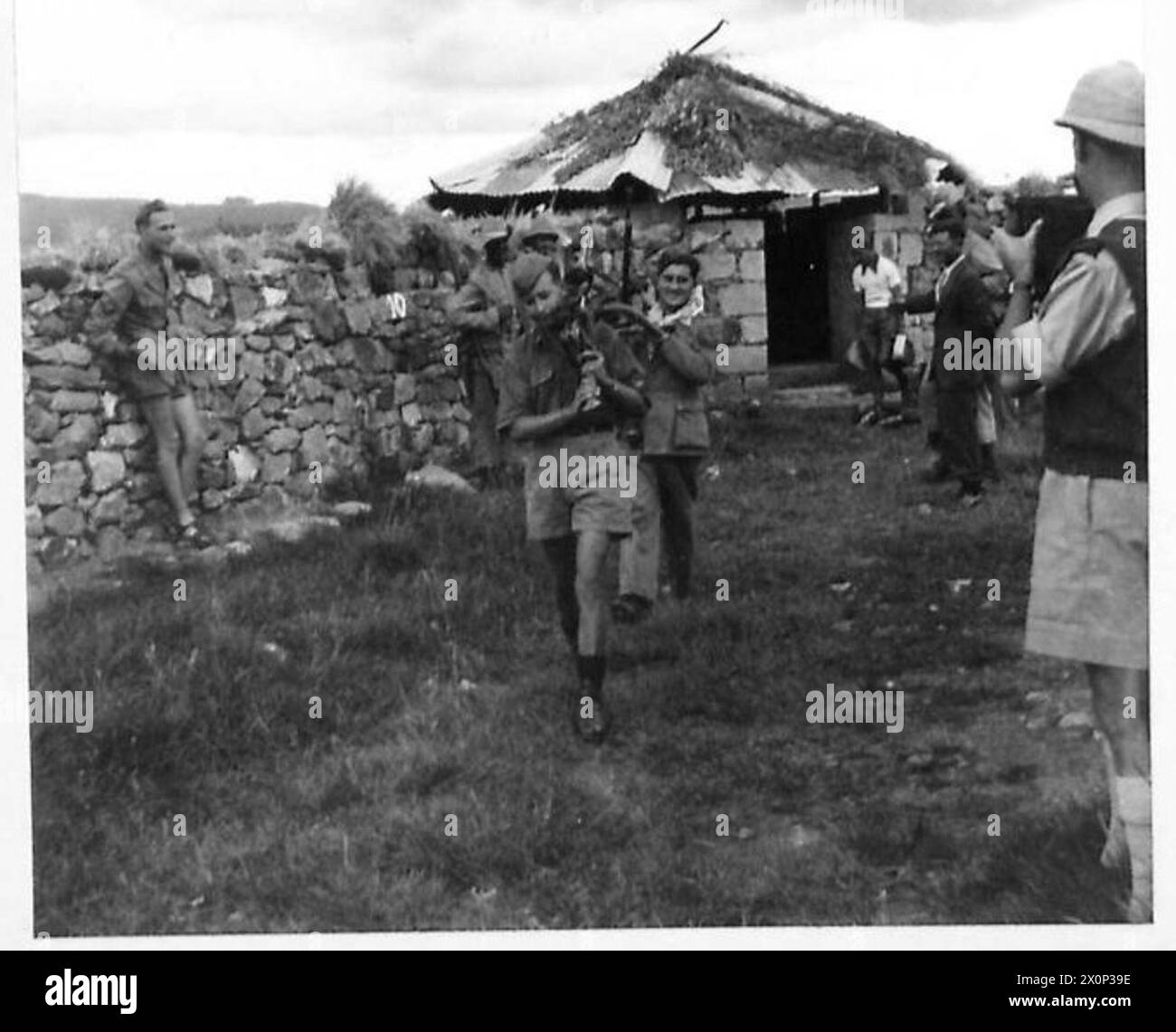 Italian soldiers surrender their outpost in Addis Ababa and carry away ...