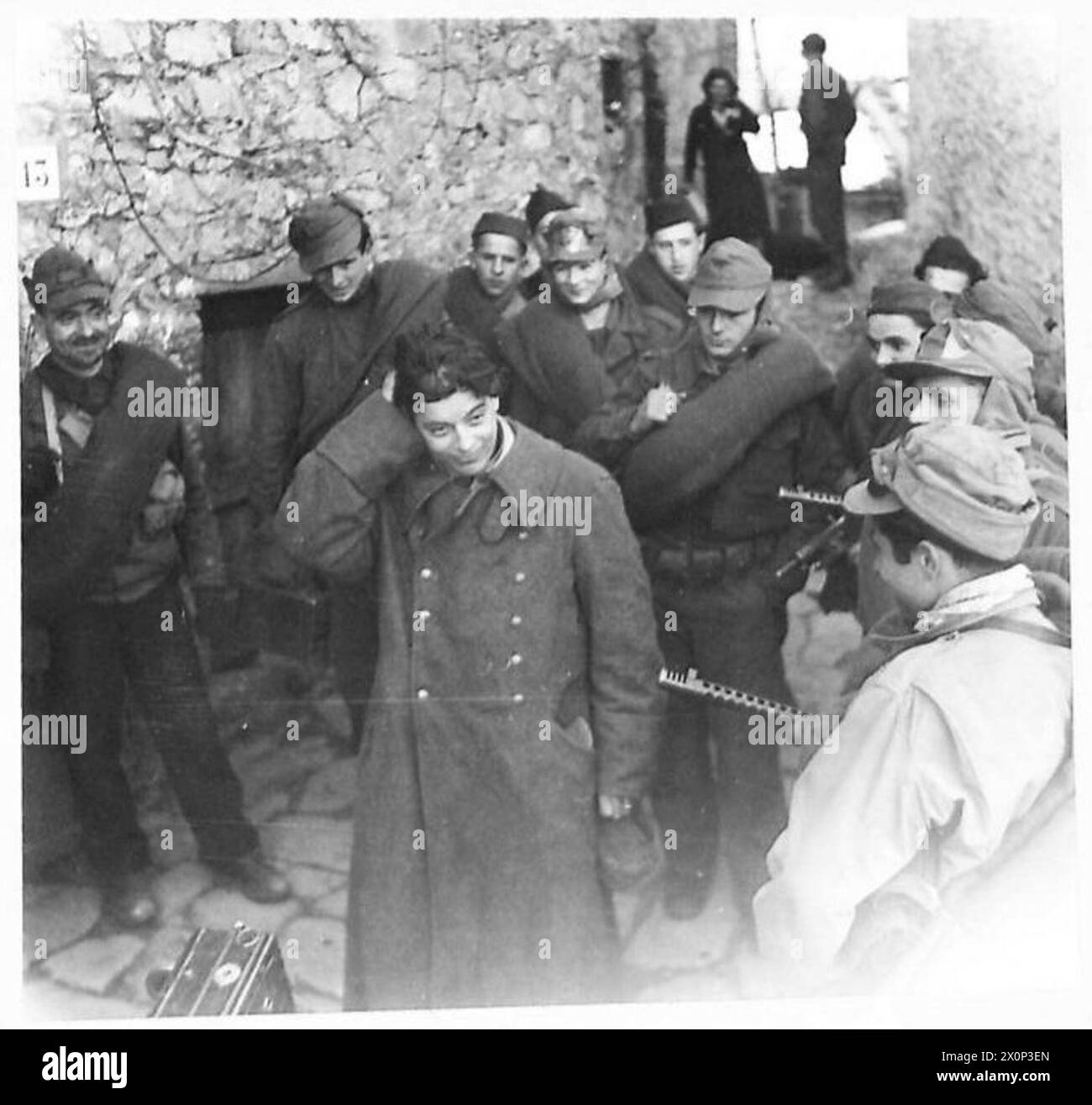 FIFTH ARMY : ITALIAN PARTISANS - The German prisoner awaits questioning ...