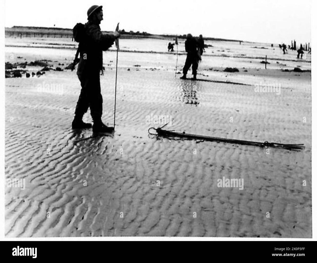 SPECIAL FOR 79TH ARMOURED DIVISION - Recce Corps marking a mud bank ...