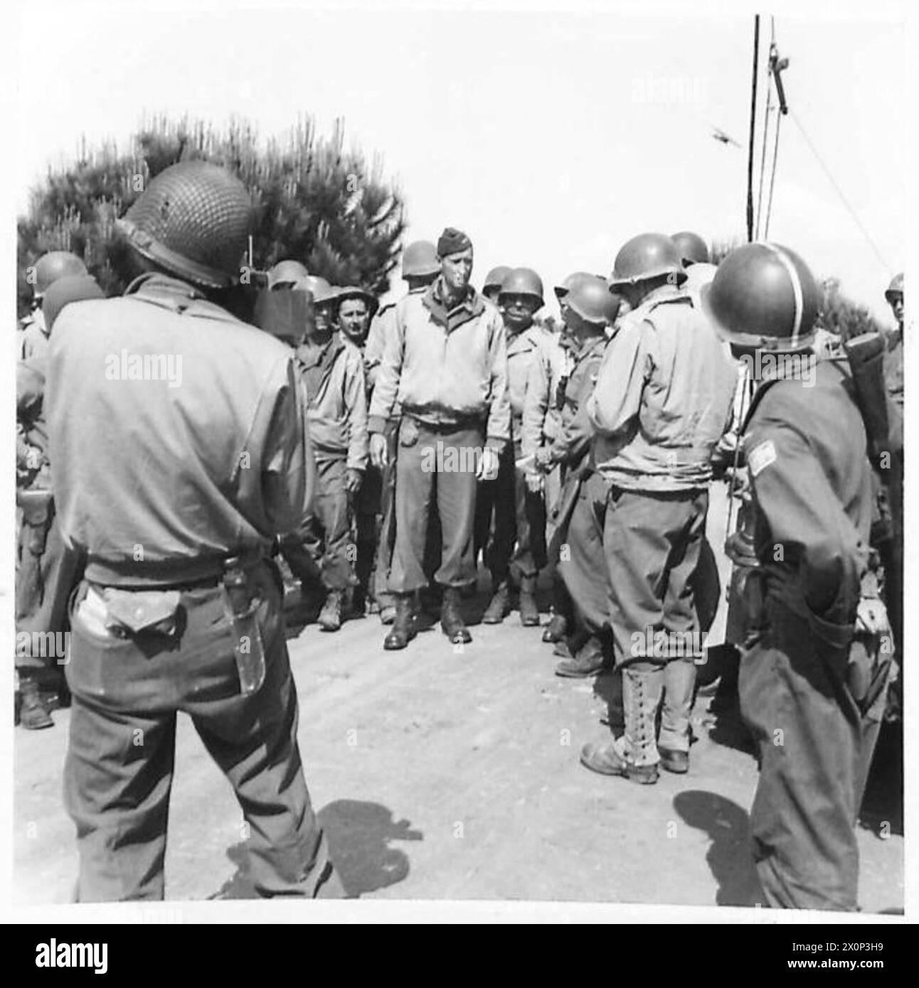 General Mark W. Clark, Fifth Army Commander, is photographed at the ...