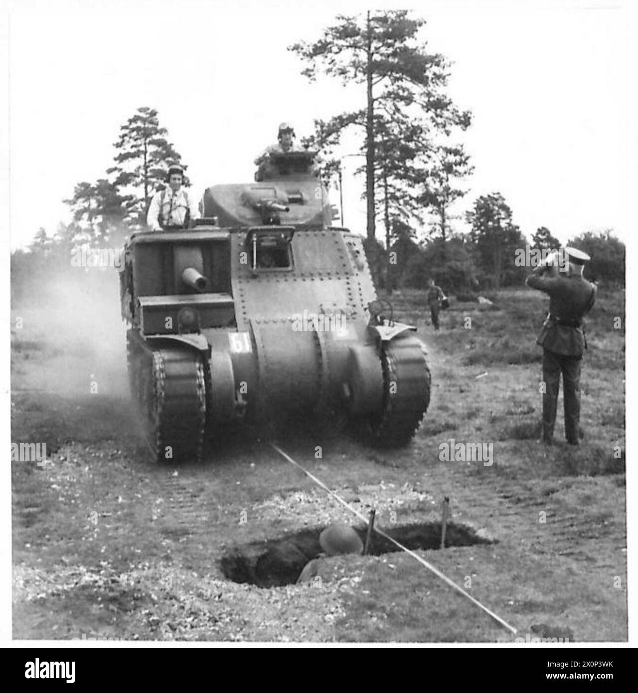 KING AND QUEEN VISIT TROOPS - Seen by their Majesties. An American ...