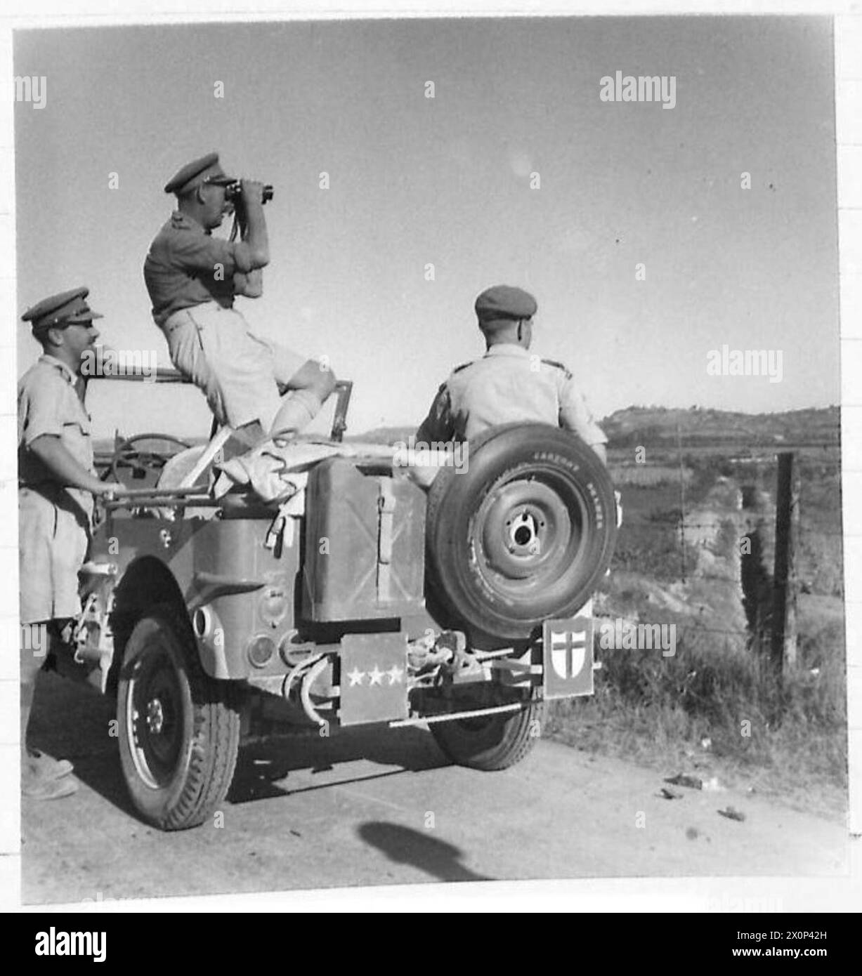 GOTHIC LINE DEFENCES - Lieut. General Sir Oliver Leese watching the ...