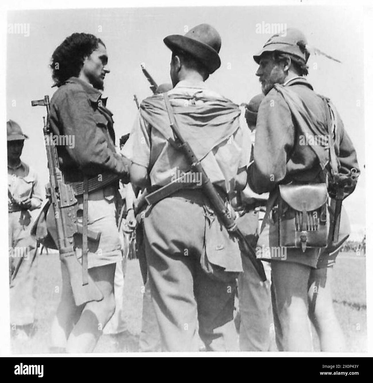 ITALY : VARIOUS - Varied types among the Partisans waiting to lay down ...