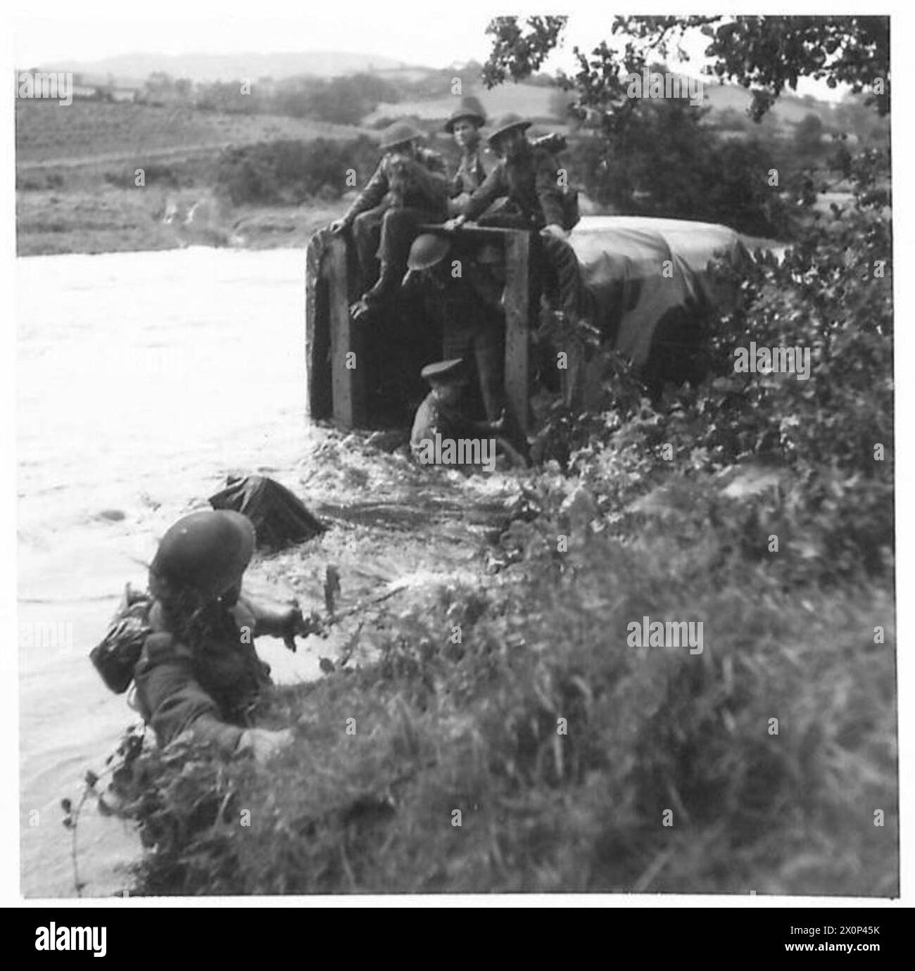 ANTI-TANK BATTERY EXERCISE - This lorry got into difficulties in river ...