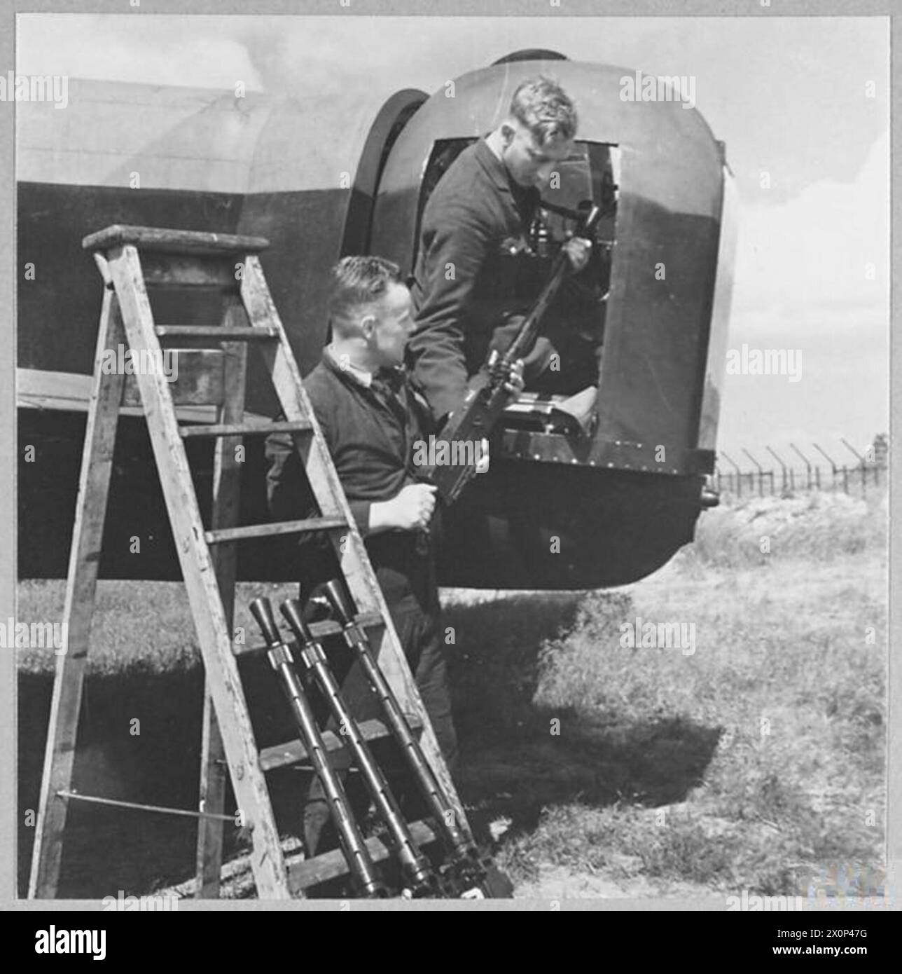Photograph of an Avro-Lancaster aircraft being prepared for a Royal Air ...