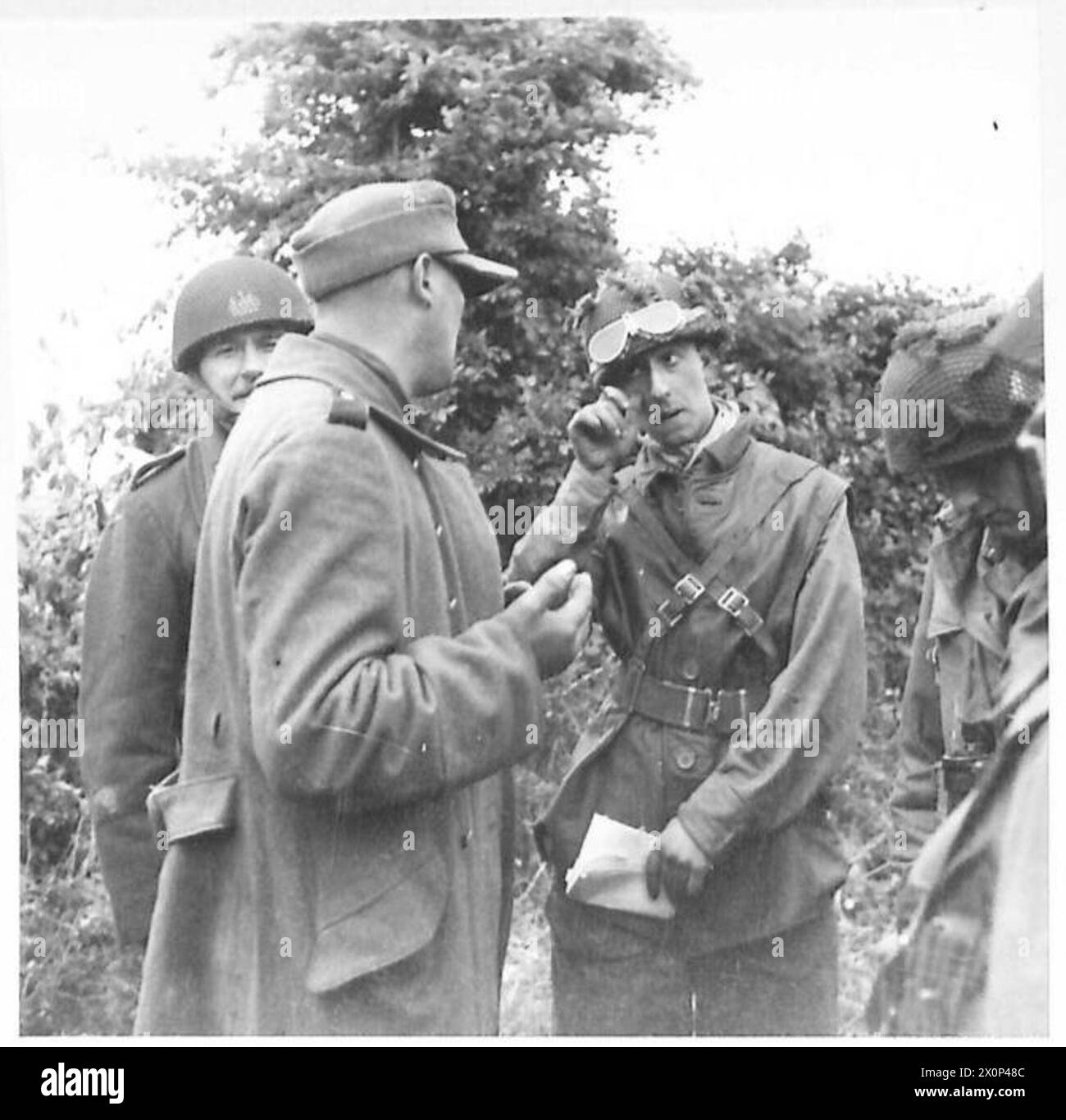 THE BRITISH ARMY IN THE NORMANDY CAMPAIGN 1944 - German POWs being ...
