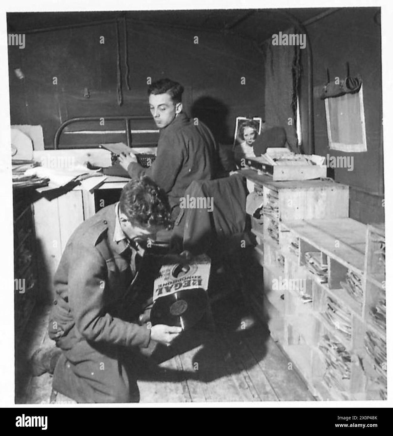 ITALY FORCES BROADCASTING 1944 - Corporal Norman Bailey typing the ...