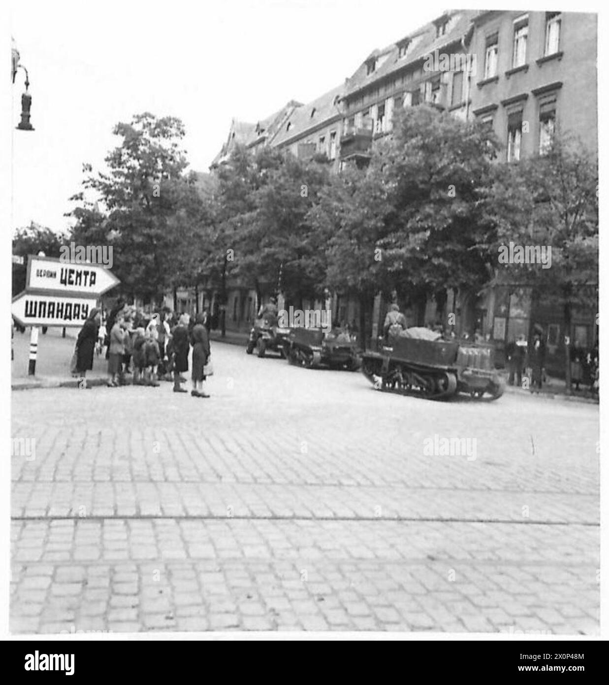 BRITISH ENTRY INTO BERLIN - Berliners watch vehicles and armour of the ...