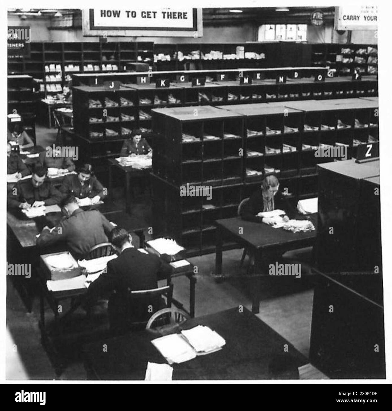 The Central Records Branch at Central Ordnance Depot, Derby, is shown ...