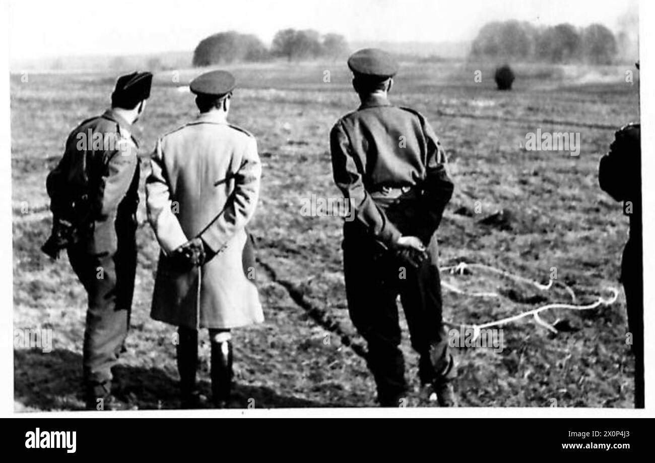 His Majesty the King observes infantry creating slit trenches using ...