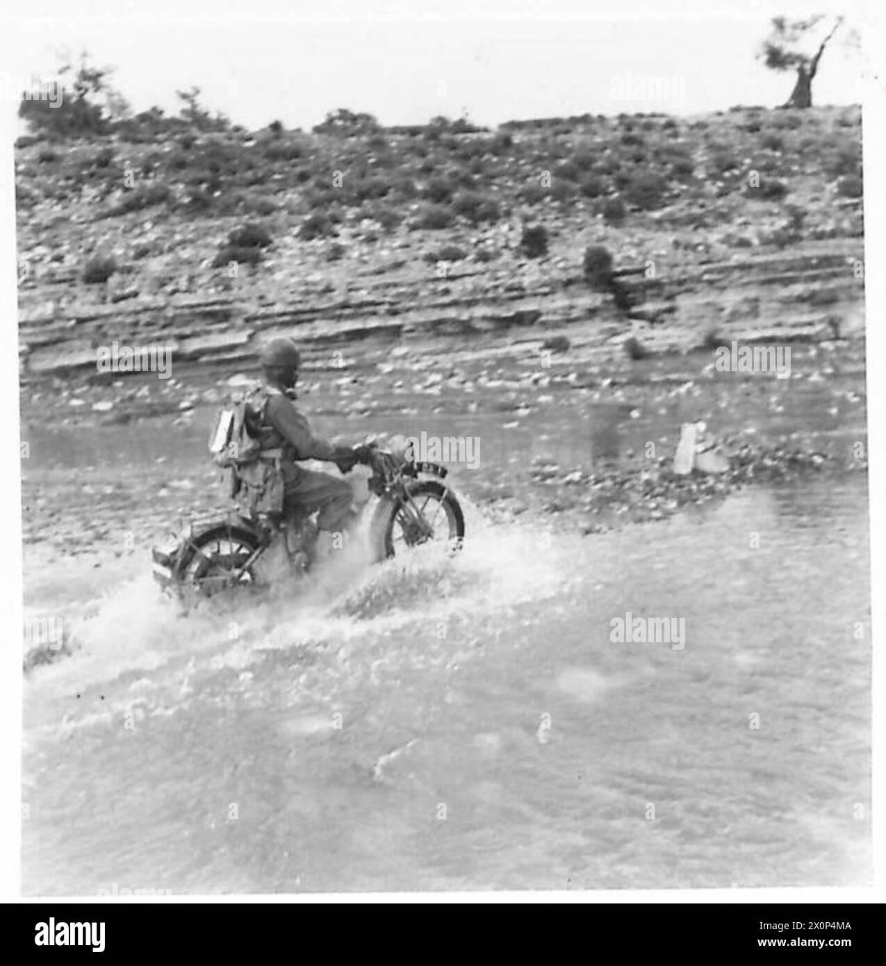 MOTORCYCLE TRIAL FOR DISPATCH RIDERS IN CYPRUS - A water splash was one ...