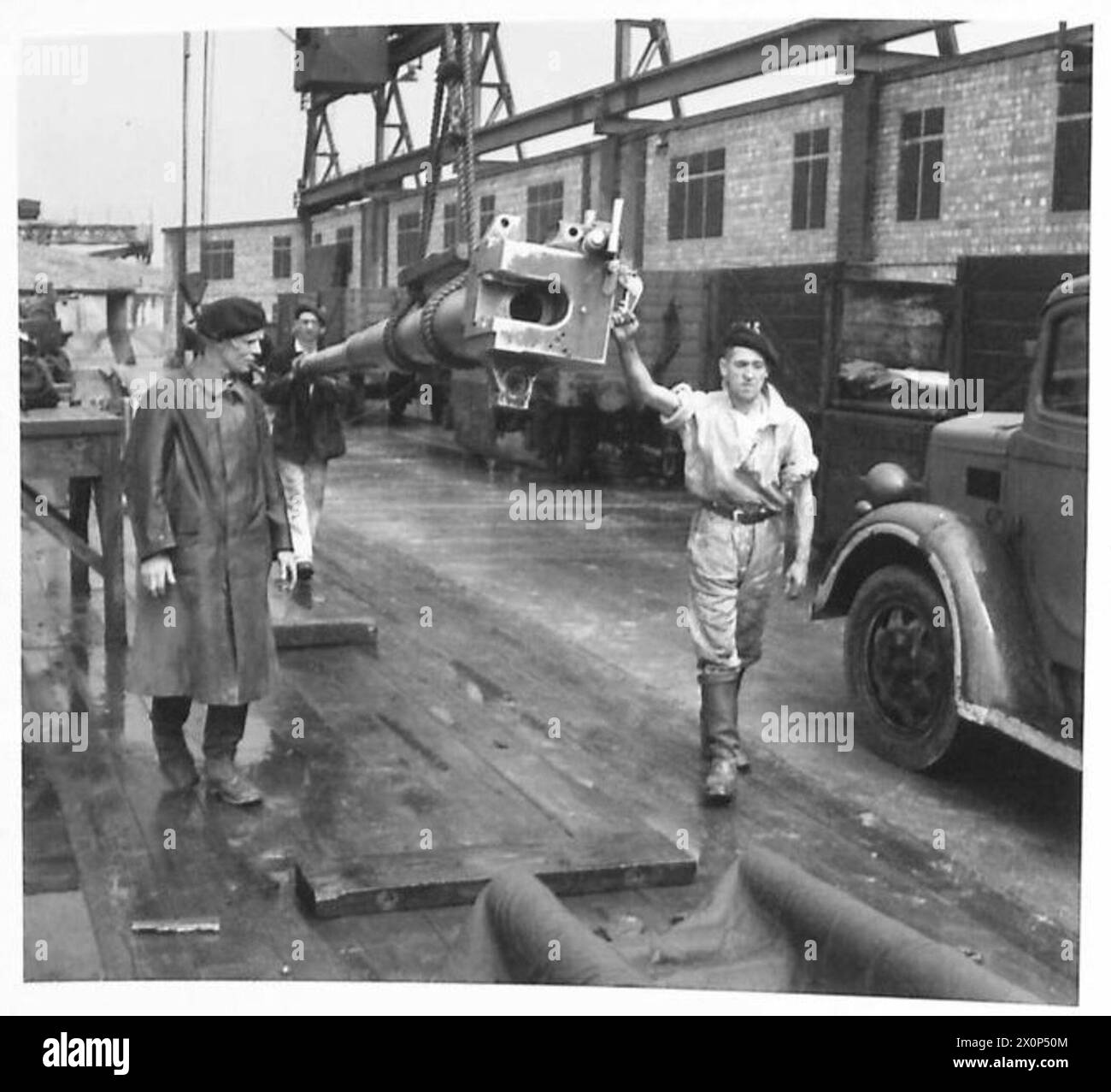 AT A PROOF RANGE - The barrel of a Bofors gun being taken away after ...