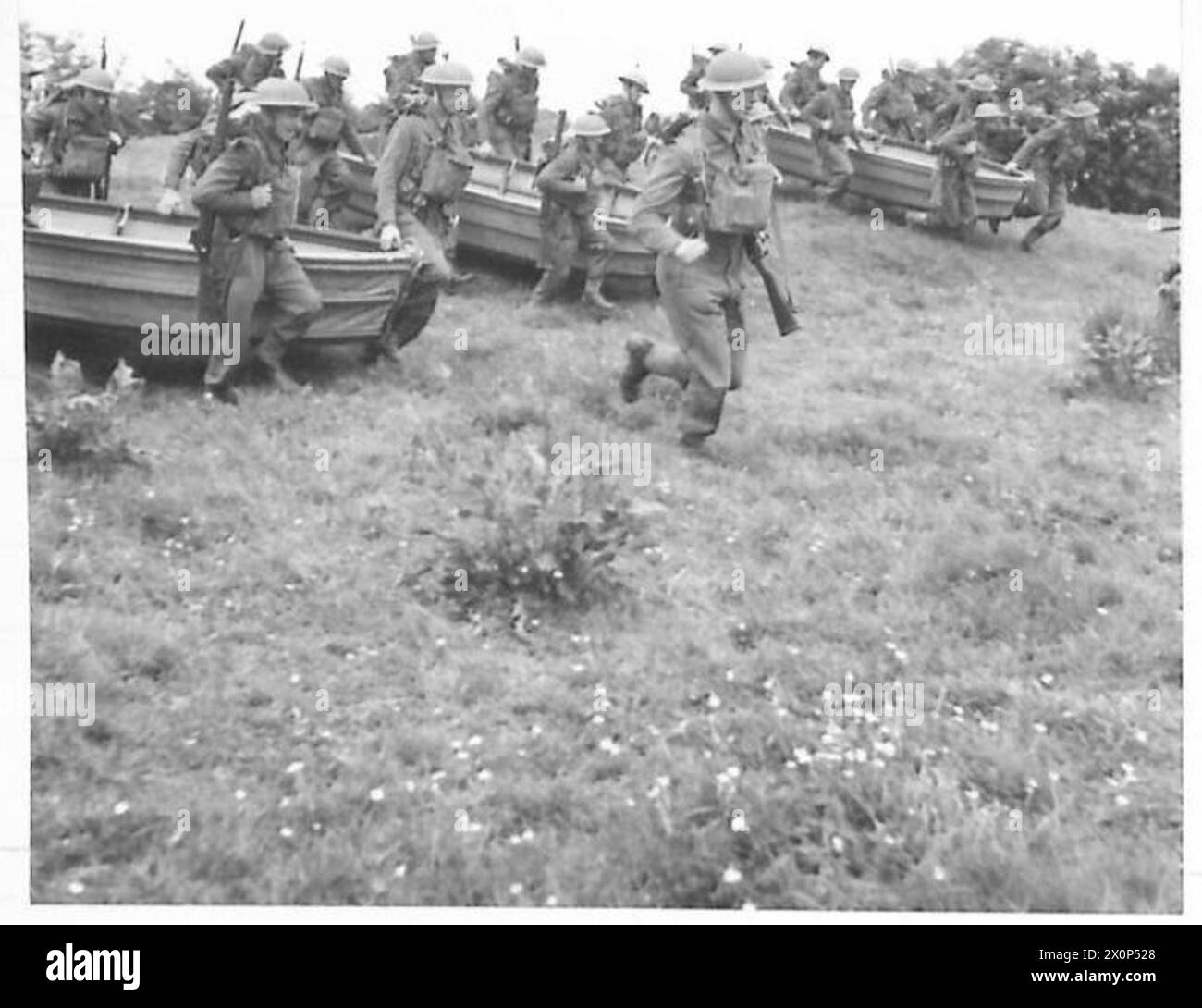 BRIGDE BUILDING AND RIVER CROSSING - Troops hauling assault boats to ...