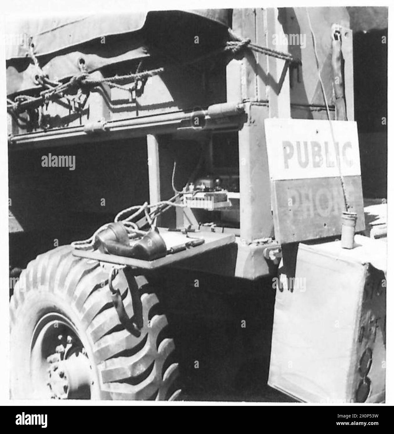 A public telephone is mounted on the side of a lorry operated by mobile ...