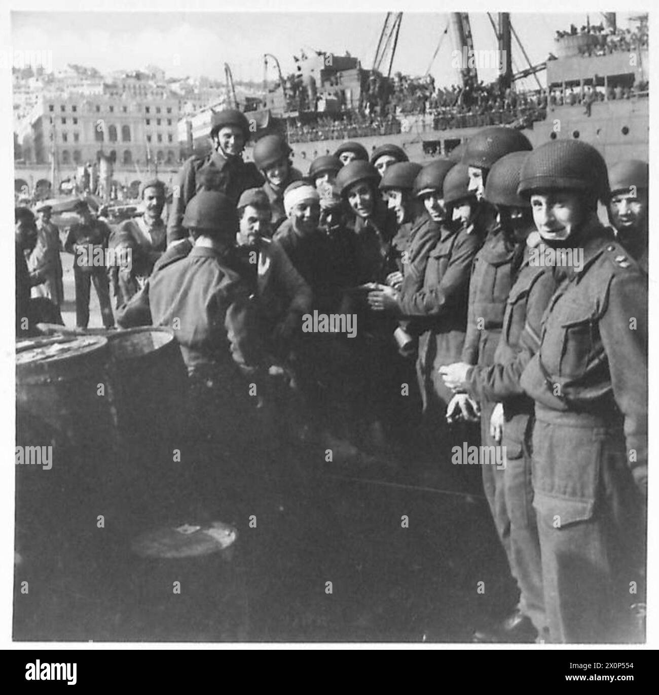British paratroops disembark from a troopship at the quayside in Allied ...
