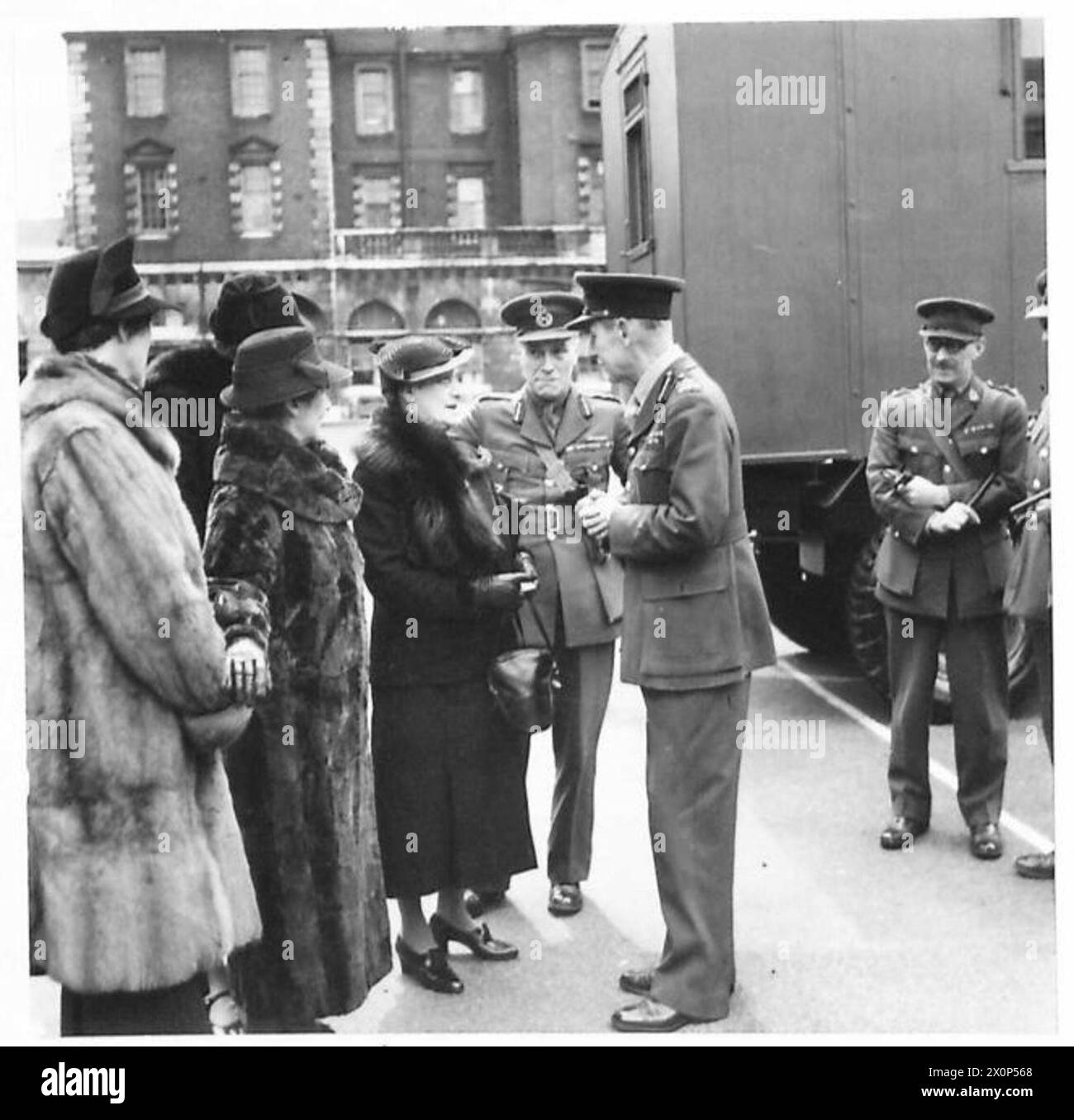 A GIFT TO THE R.A.M.C. - Miss H.E.Hope-Clarke, OBE with (right) Lieut ...