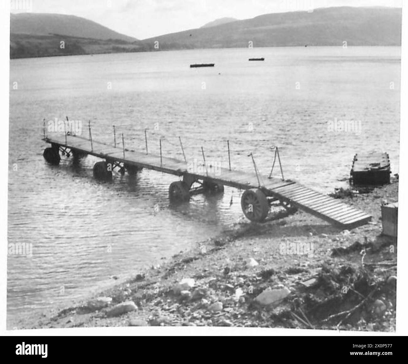 A 60-foot wheeled pier is shown in photographs of British Army ...