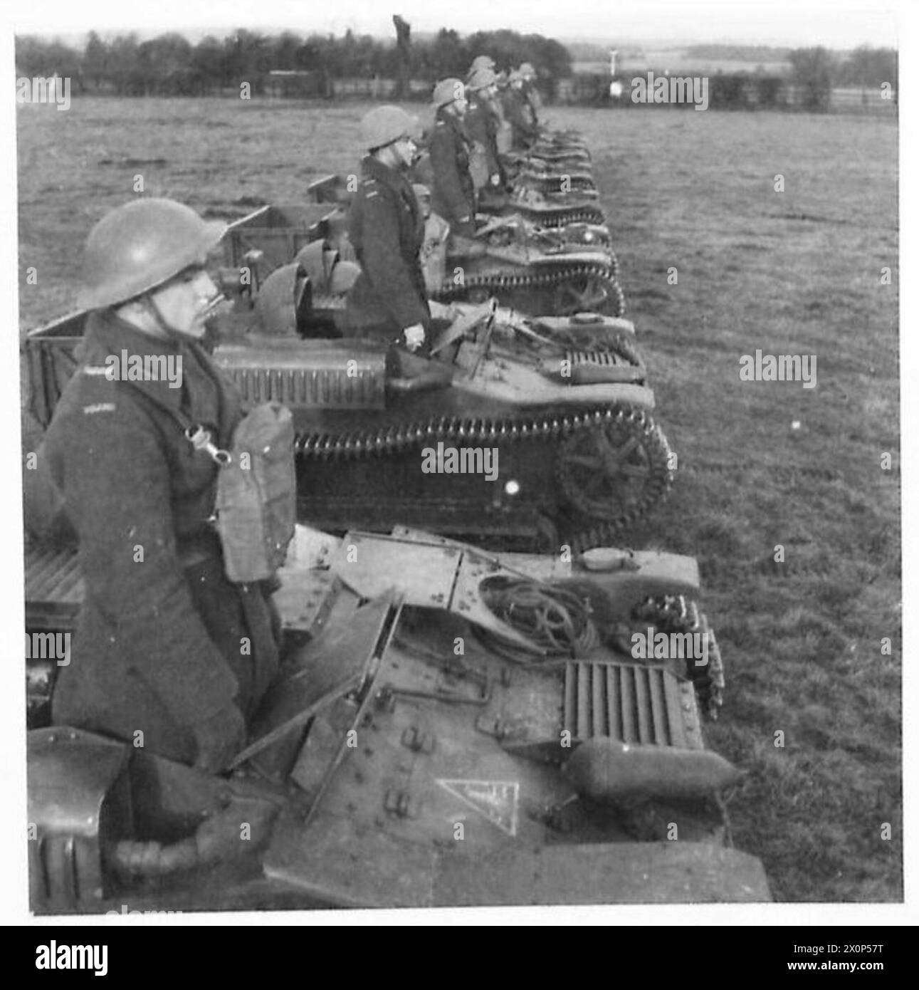 Troops of the 10th Armoured Cavalry Brigade, 1st Polish Corps, stand at ...