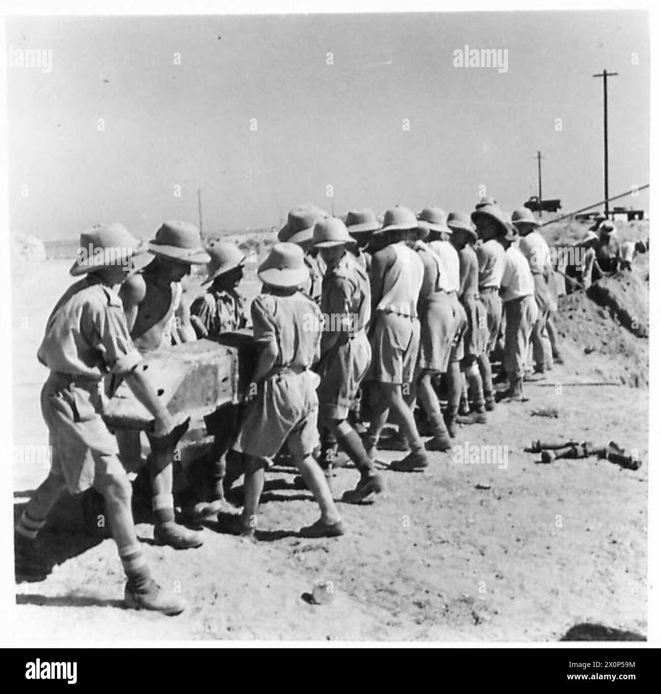 WITH THE GUNNERS IN CYPRUS - The erection of improvised sheer legs for ...