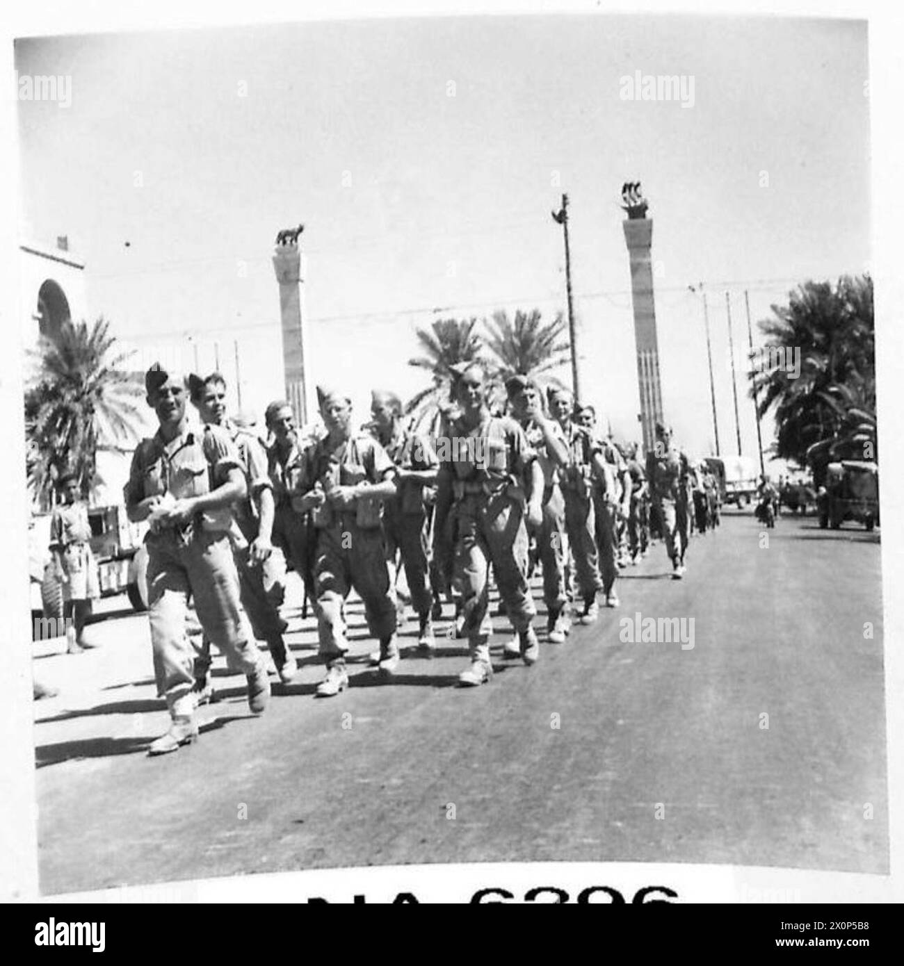 NORTH AFRICA : INVASION PREPARATIONS - Troops marching along the main ...