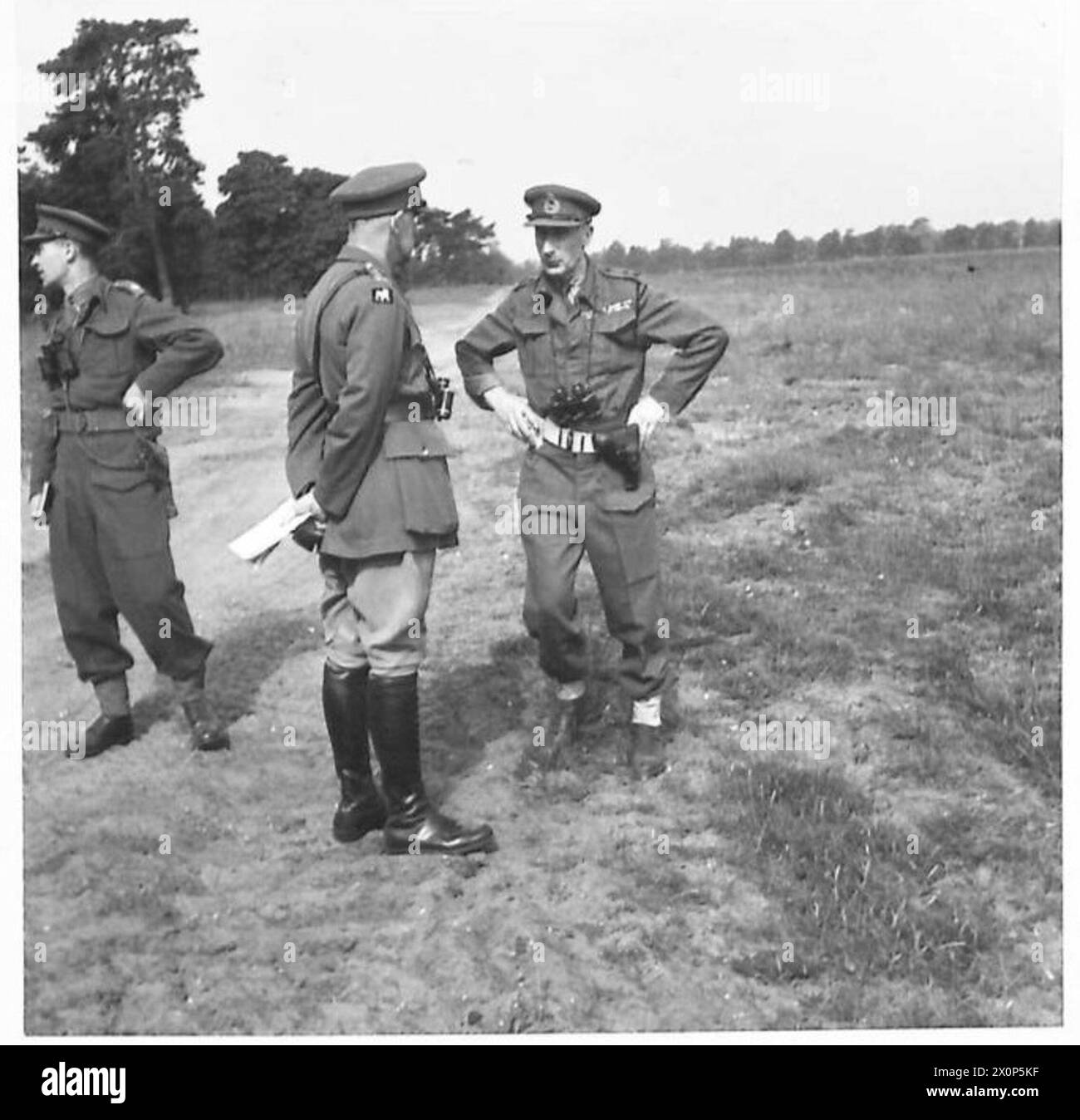 Major General E.H. Barker observes a divisional exercise in the Eastern ...