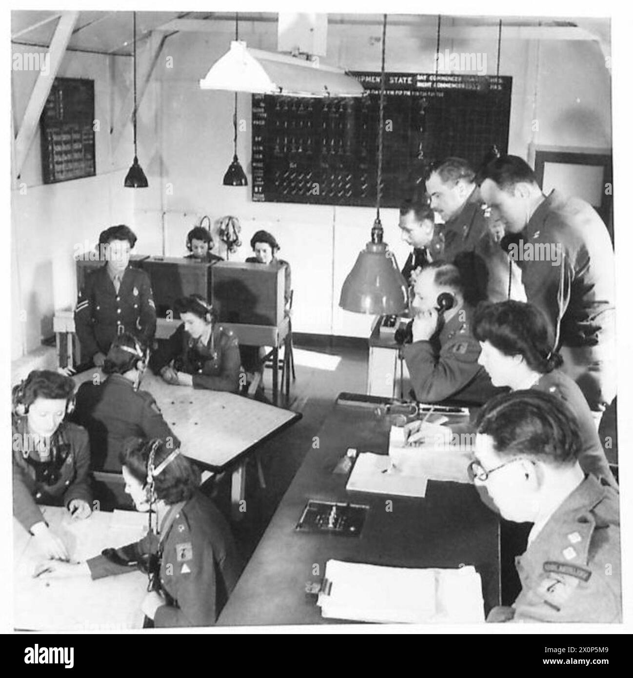 Portraits show anti-aircraft command officers and the operations room ...