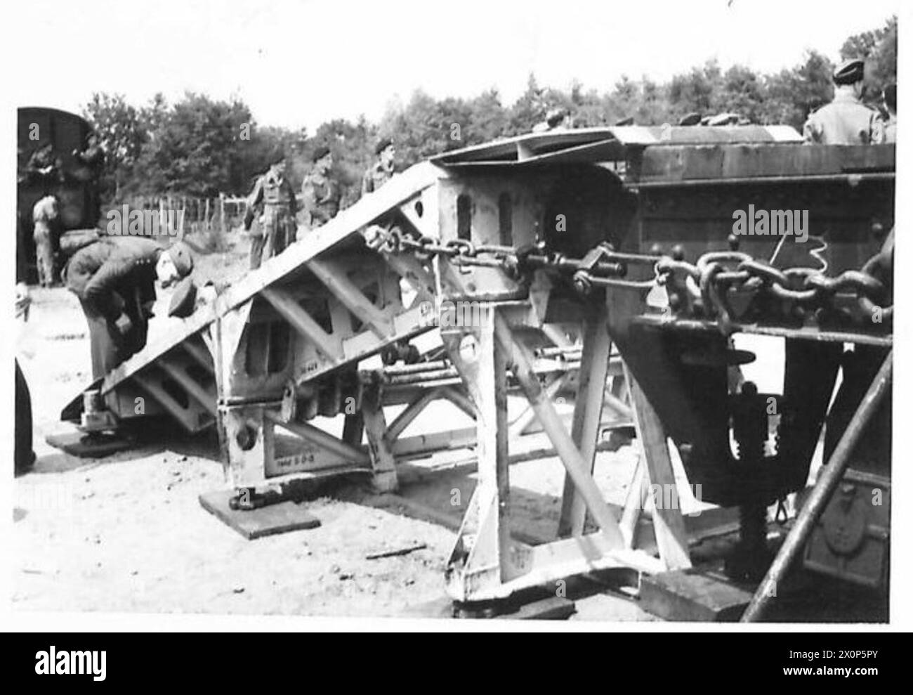 The Warrell 50-ton tank ramp is shown along with its method of assembly ...