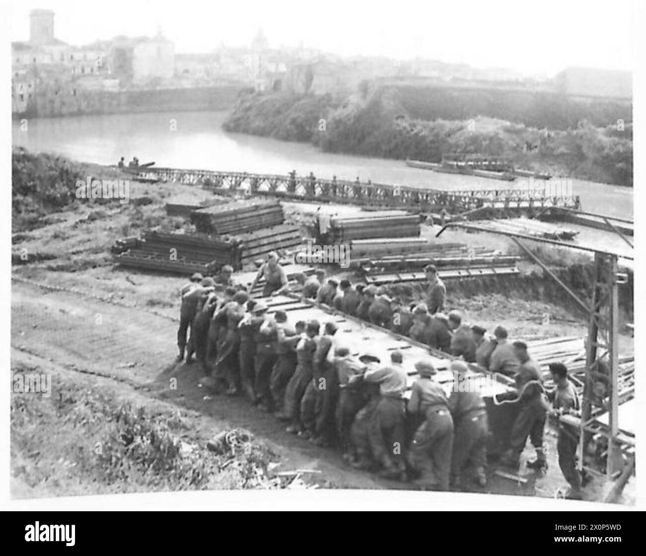 ITALY FIFTH ARMY FRONT FLOATING PONTOON BAILEY BRIDGE - REs carry a ...