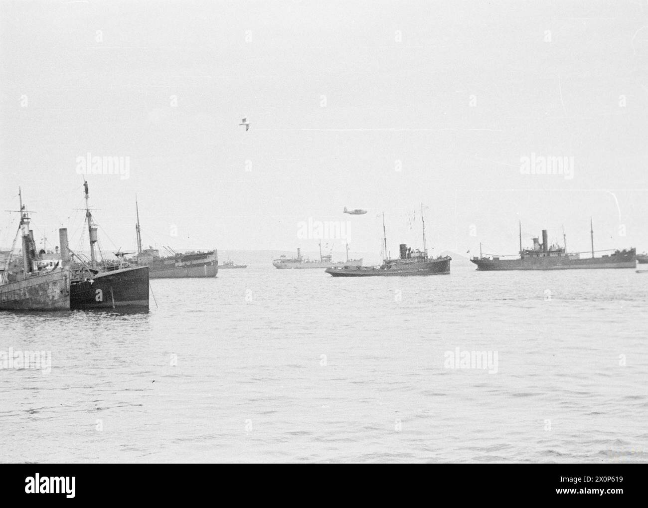 Allied forces’ ships are docked at the Norwegian port of Harstad in May ...