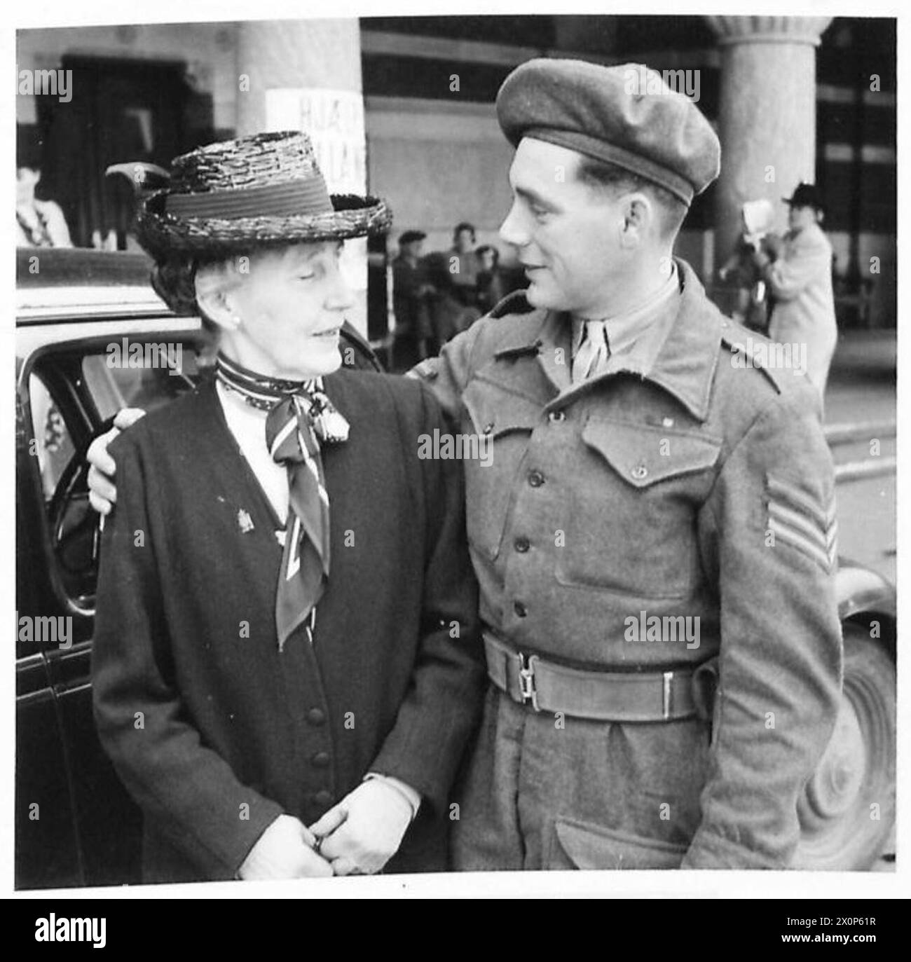 Photographic negative showing Sergeant D. La Cour reunited with his ...
