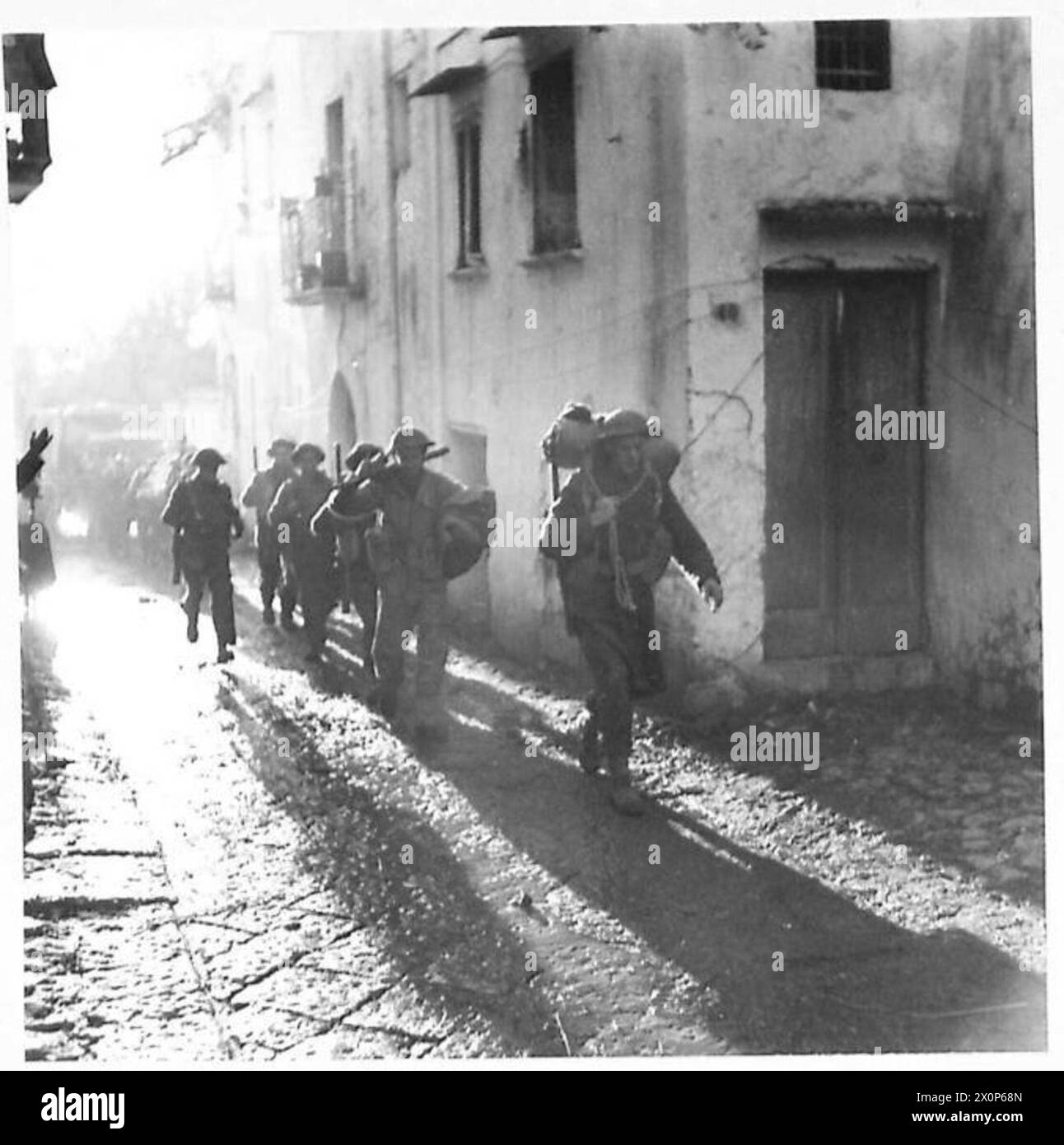 FIFTH ARMY - BRITISH SECTION - Infantrymen setting off on patrol ...