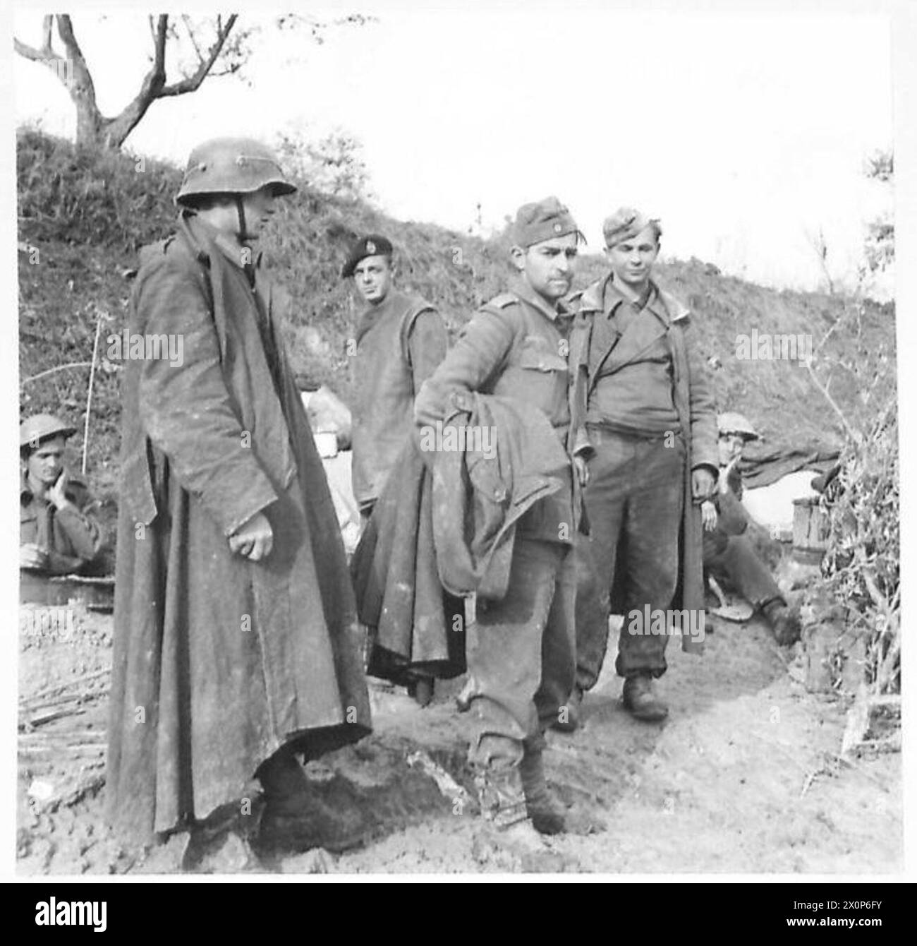 Dejected German soldiers captured by patrols probing enemy defenses on ...