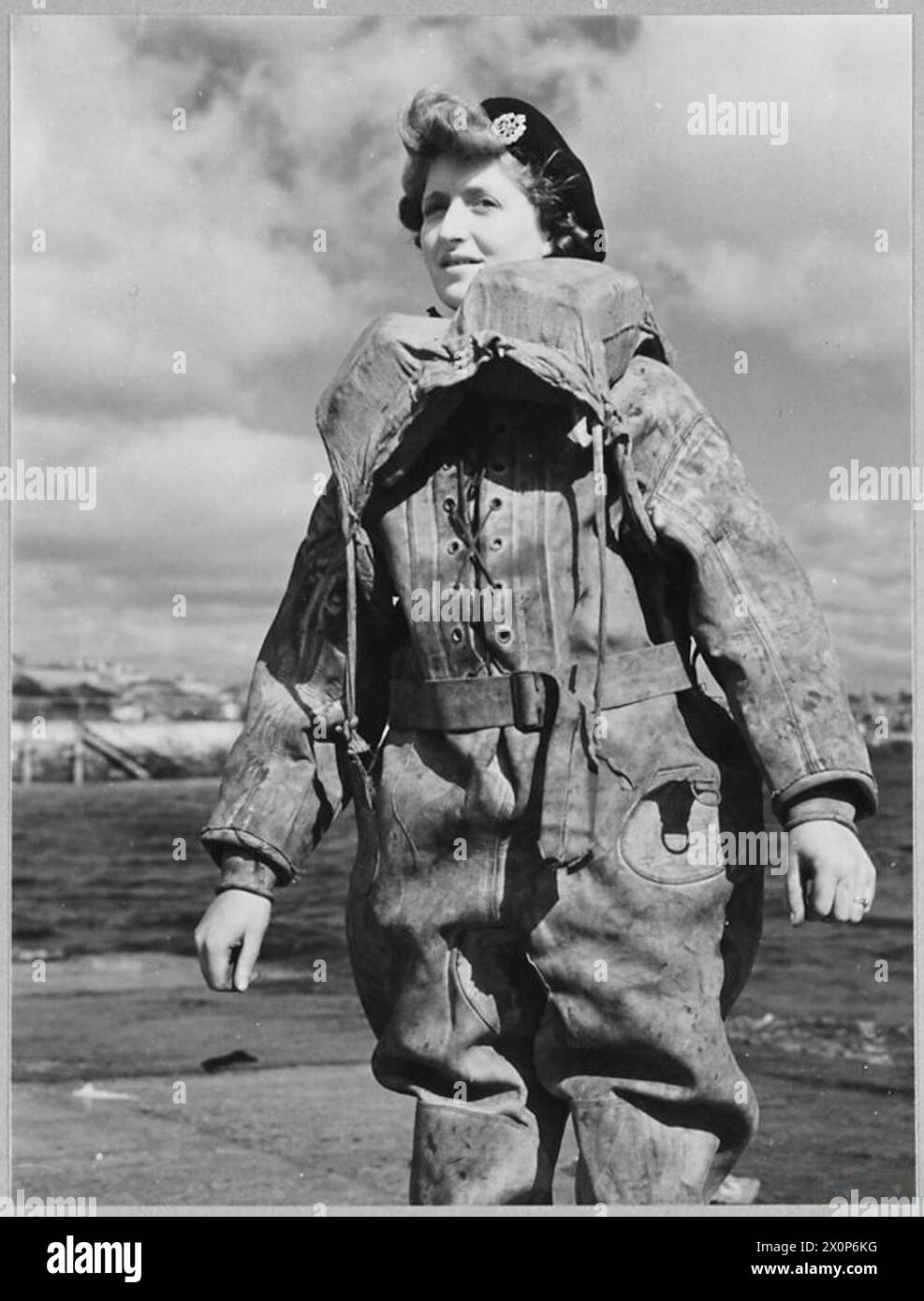 W.A.A.F. OF COASTAL COMMAND - A rubber-suited W.A.A.F. flight mechanic ...