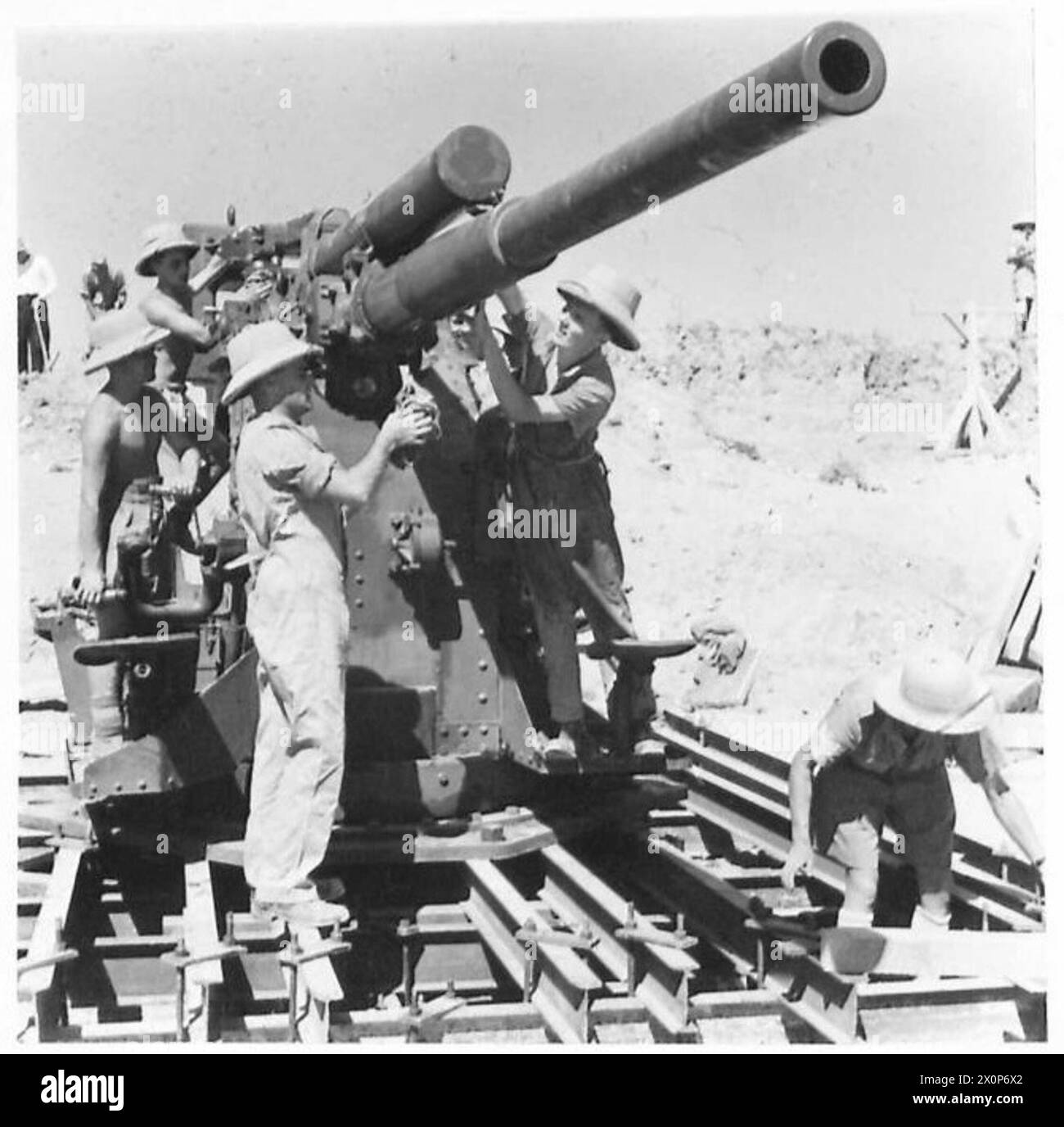 WITH THE GUNNERS IN CYPRUS - Assembling the small parts of the gun ...