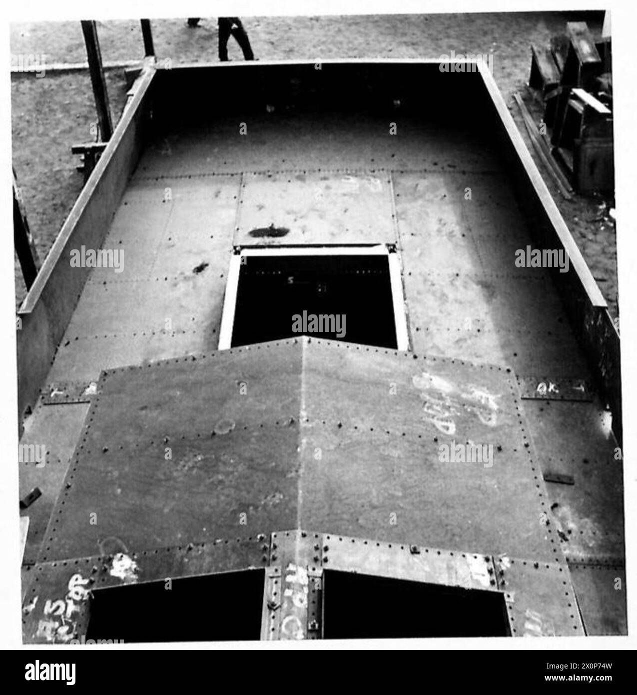 A prototype single screw Unicraft tug is shown aft, highlighting the ...