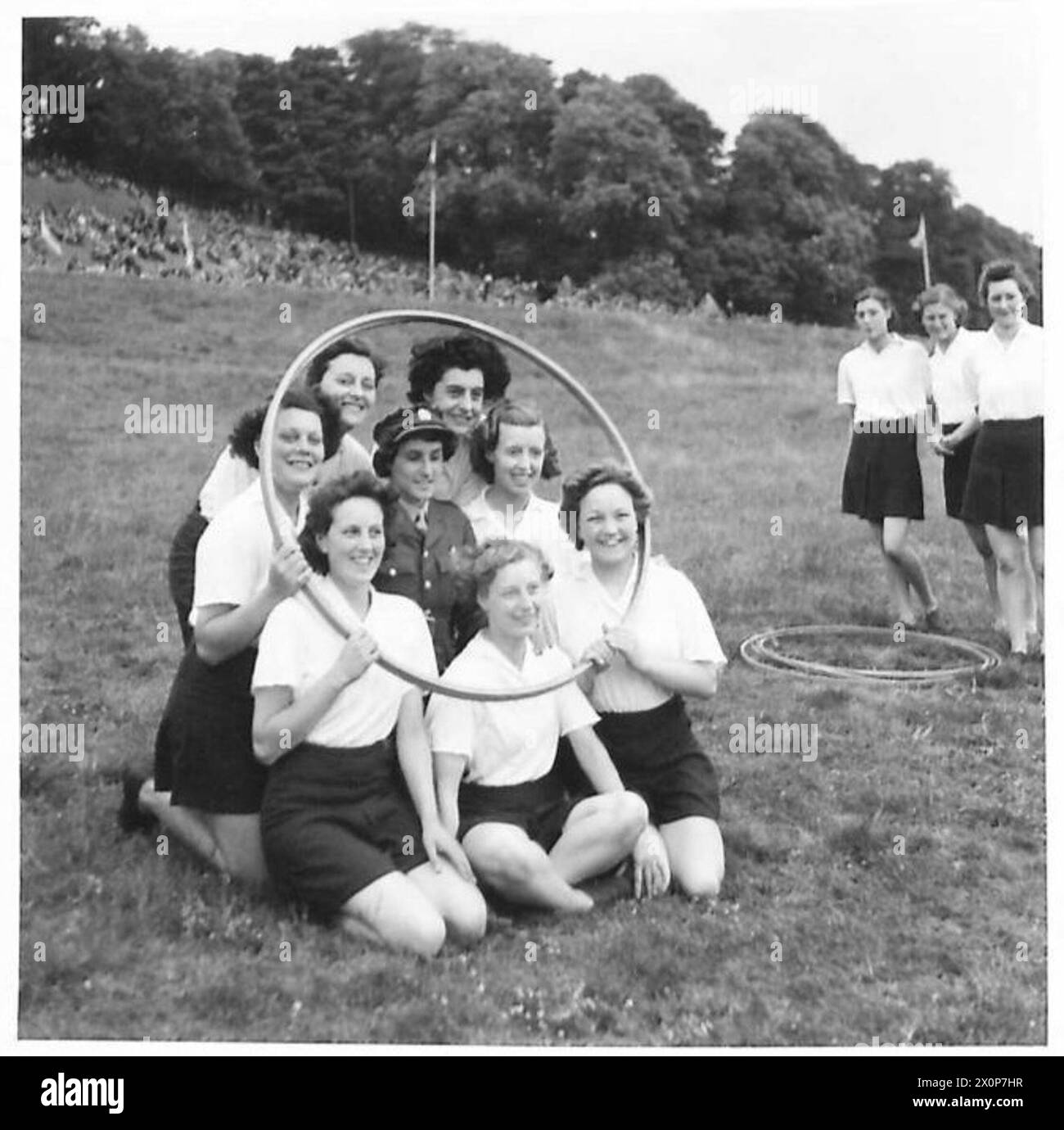 MILITARY DISPLAY FOR FACTORY WORKERS - All smiles. Members of the ATS ...