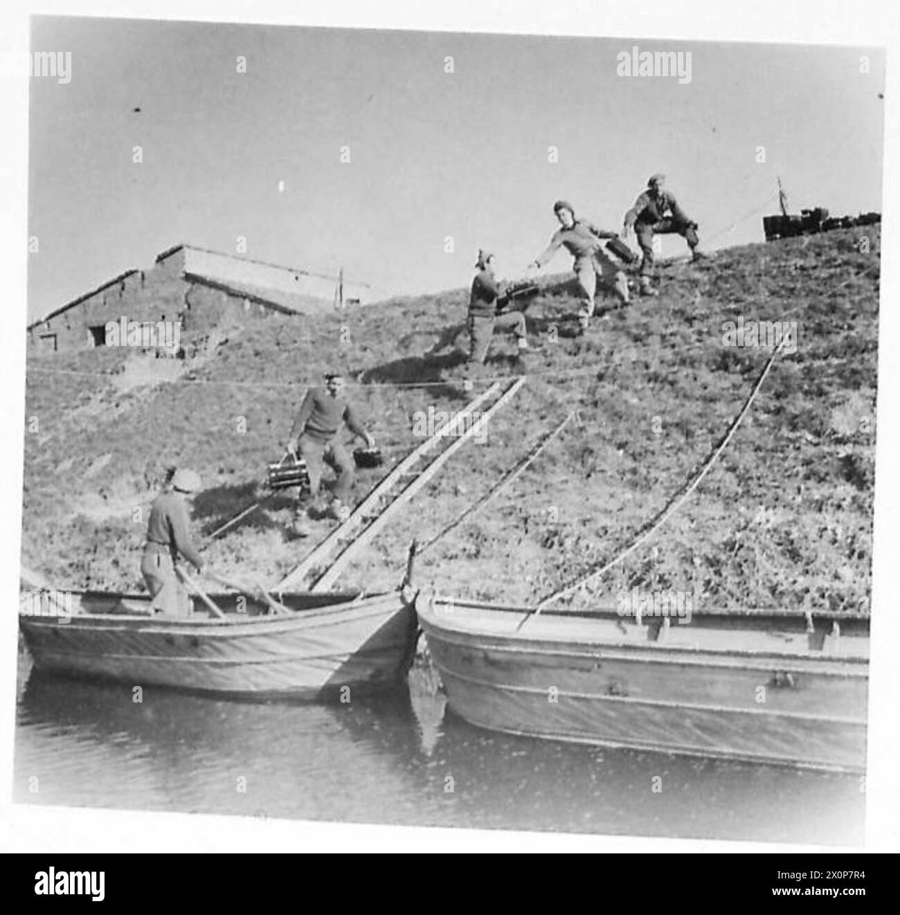 EIGHTH ARMY : JEWISH BRIGADE IN ACTION - Loading cans of fresh water ...