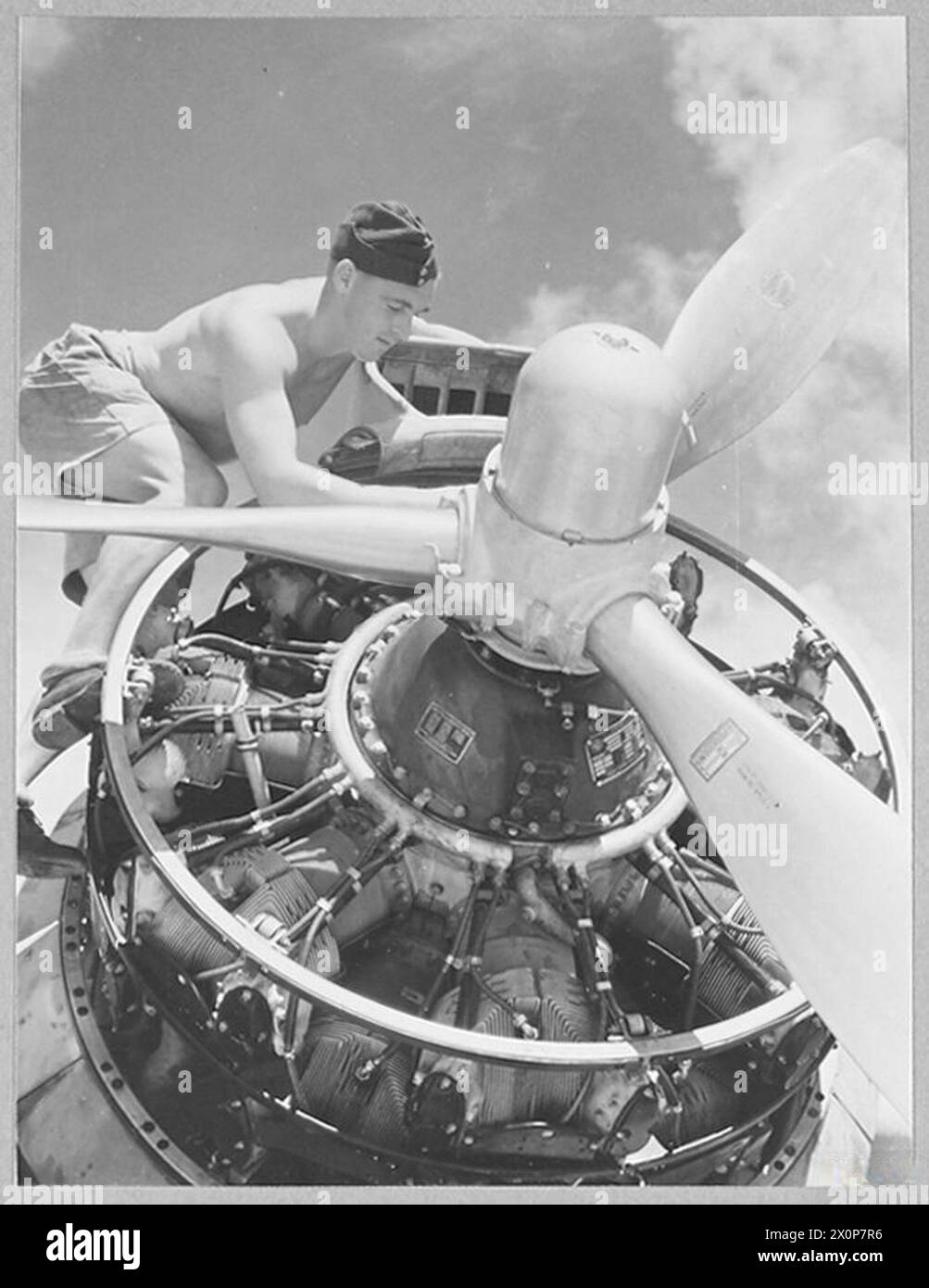Aircraftman G. Brown of RAF Transport Command works on a Baltimore ...