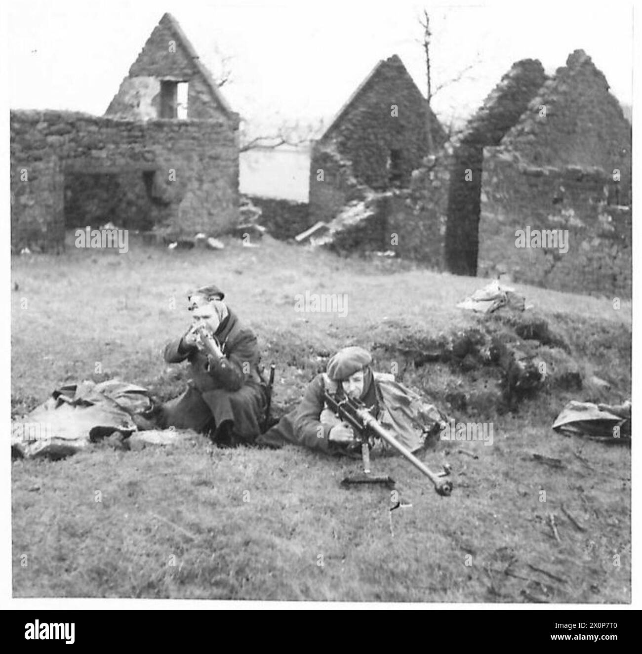 An anti-tank gunner of the 1st Polish Corps, supported by a squadmate ...