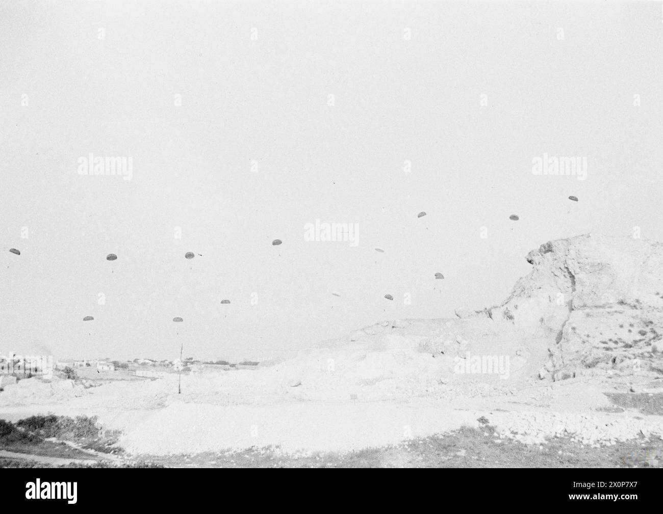 CRETE, GERMAN PARACHUTE TROOPS LAND ON THE ISLAND. MAY 1941. THE GERMAN ...