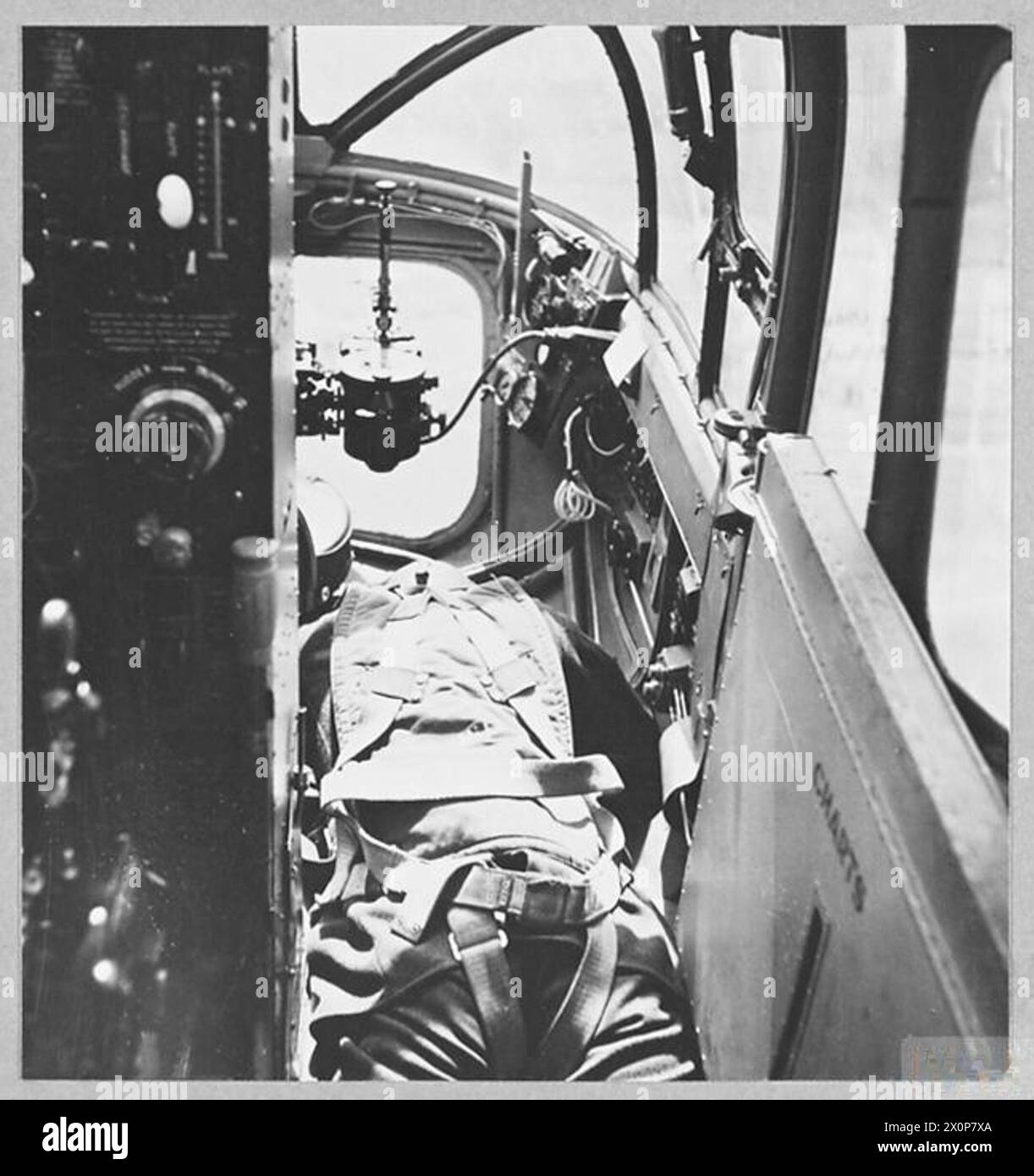 The bomb aimer of a Beaufort aircraft releases bombs during low ...
